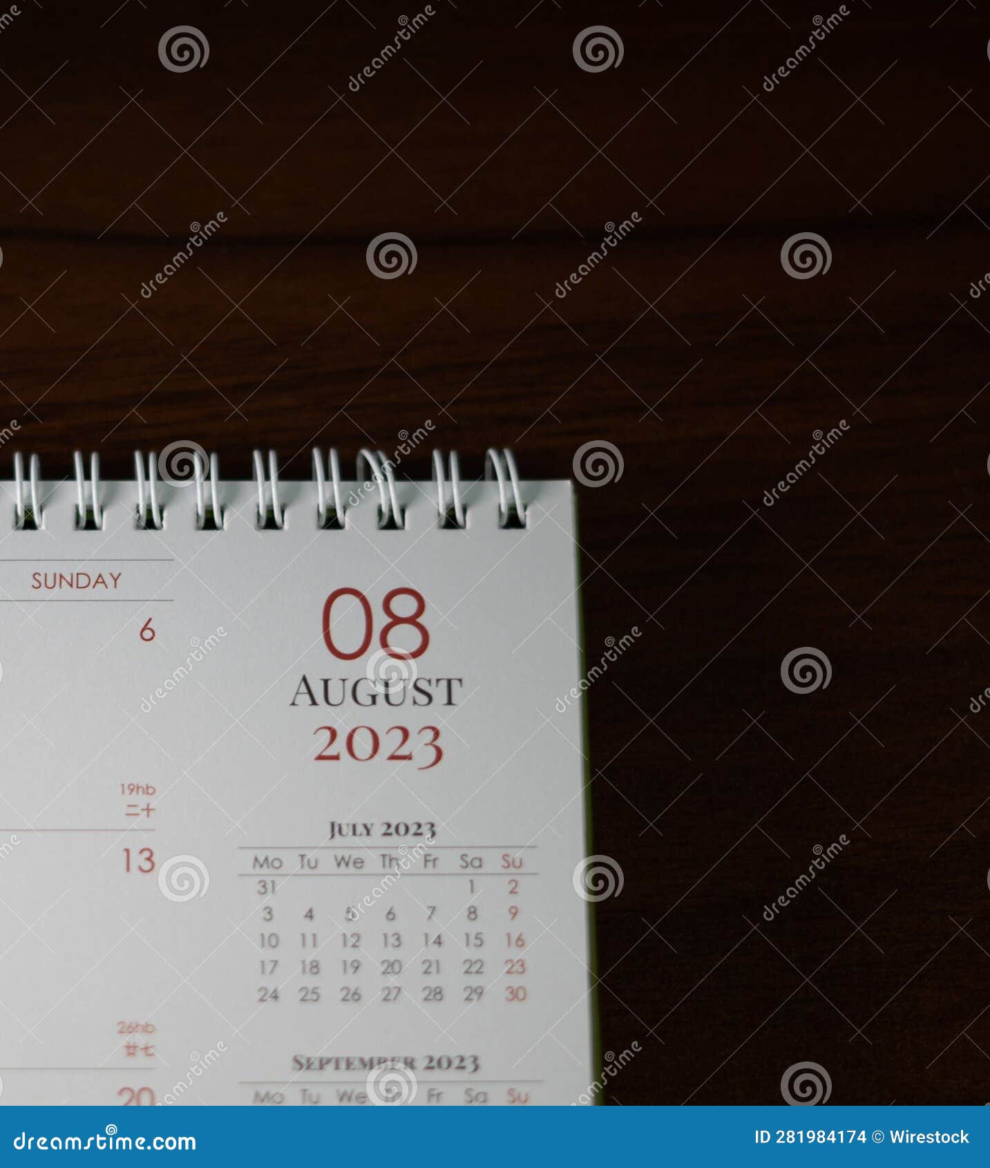 The Table Has a Calendar that is Full of Dates on it Stock Photo ...