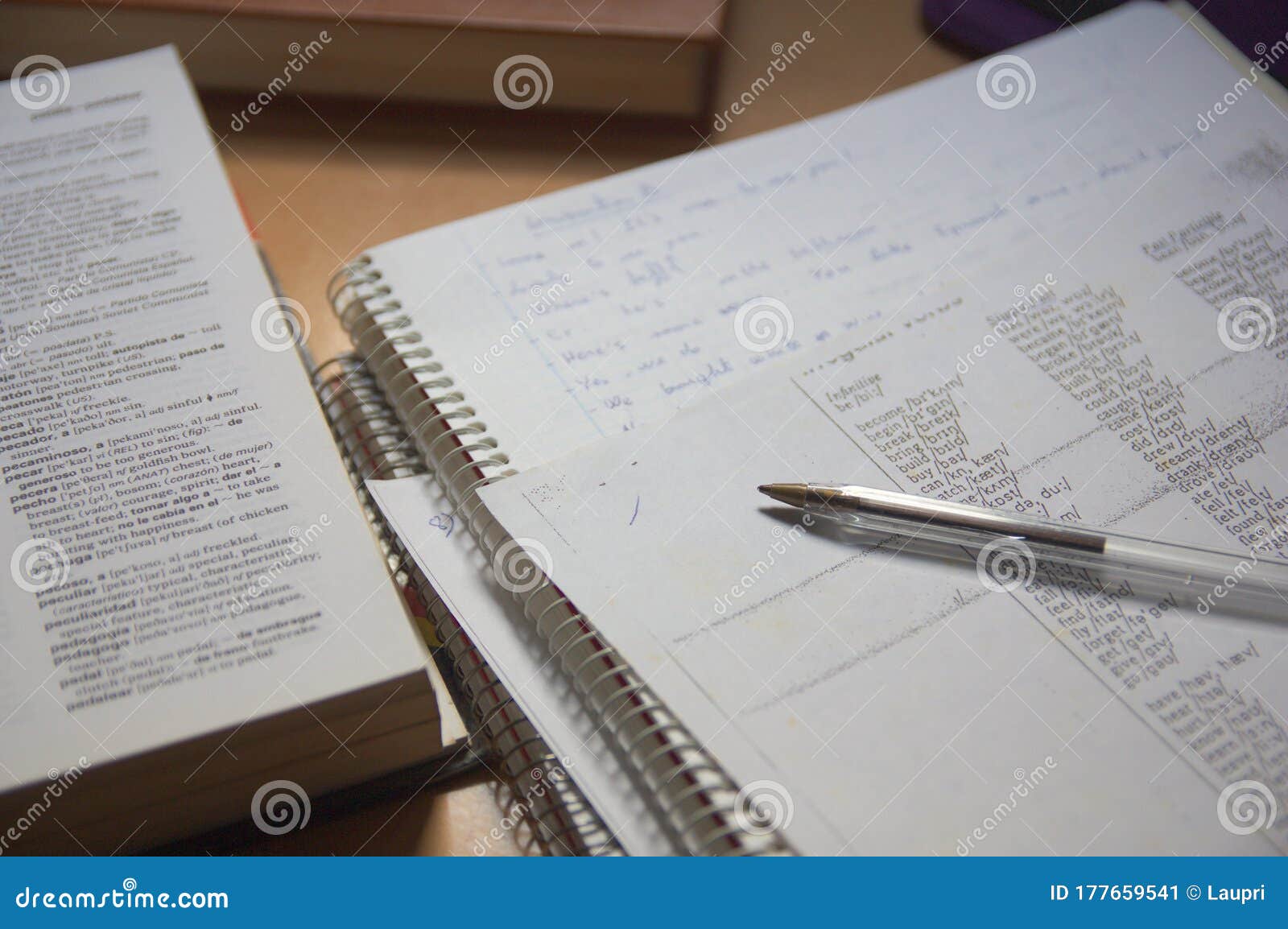 A Table with the Homework and Books of an English Language Learner ...