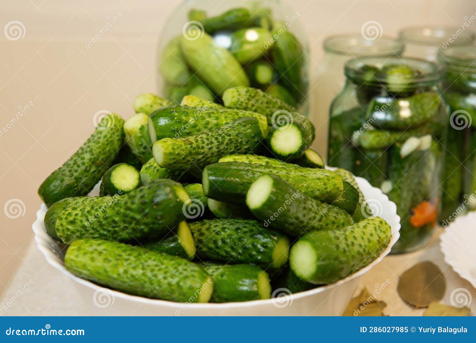 On the Table are Jars and Plates of Fresh Pickles Stock Image - Image ...