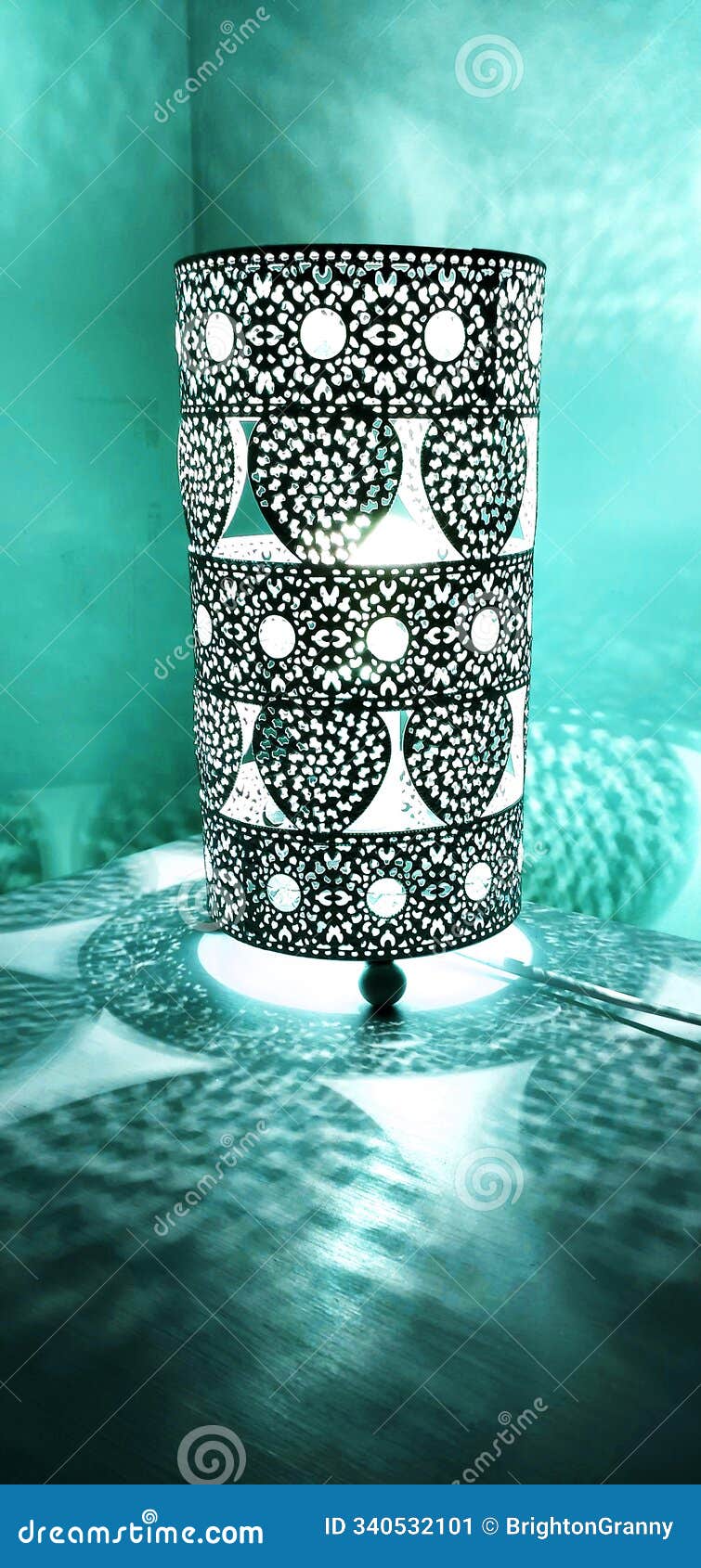 Table Lamp with Cut Outs Creating a Pattern. Stock Image - Image of ...