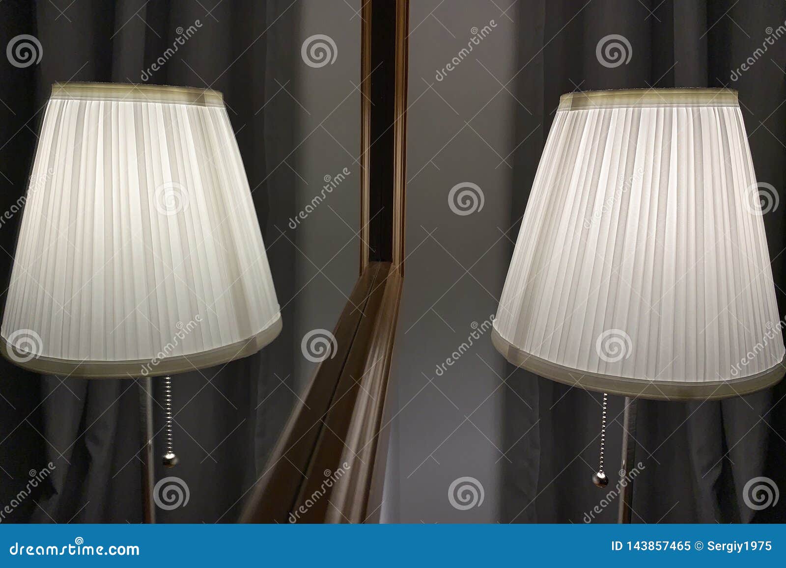Table Lamp with Lampshade on the Table in Front of a Mirror Stock Image ...
