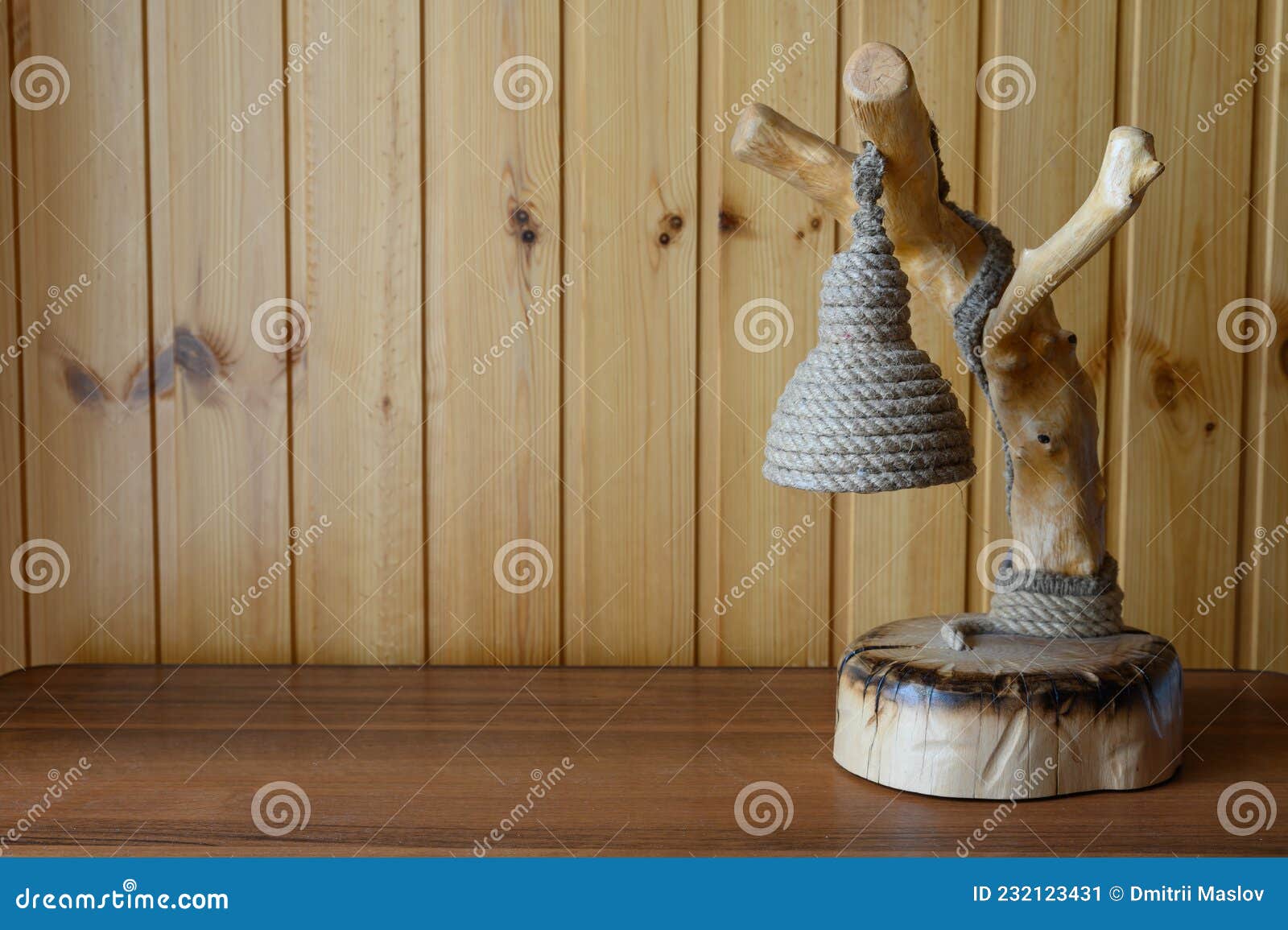 A Table Lamp Made of a Tree Branch with a Rope Lampshade Stands on the ...