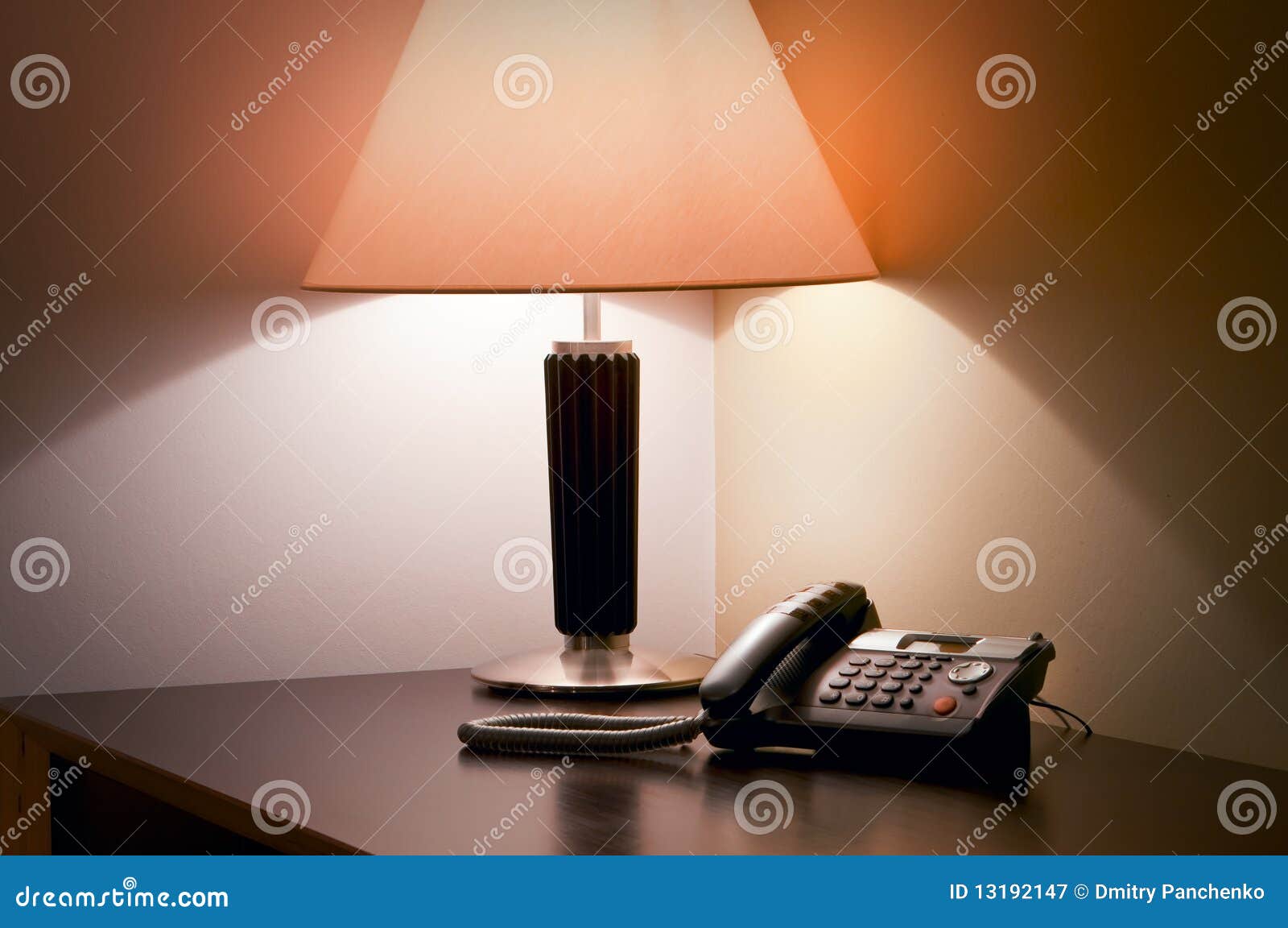 Table with Lamp and Phone on it Stock Image - Image of telephone ...