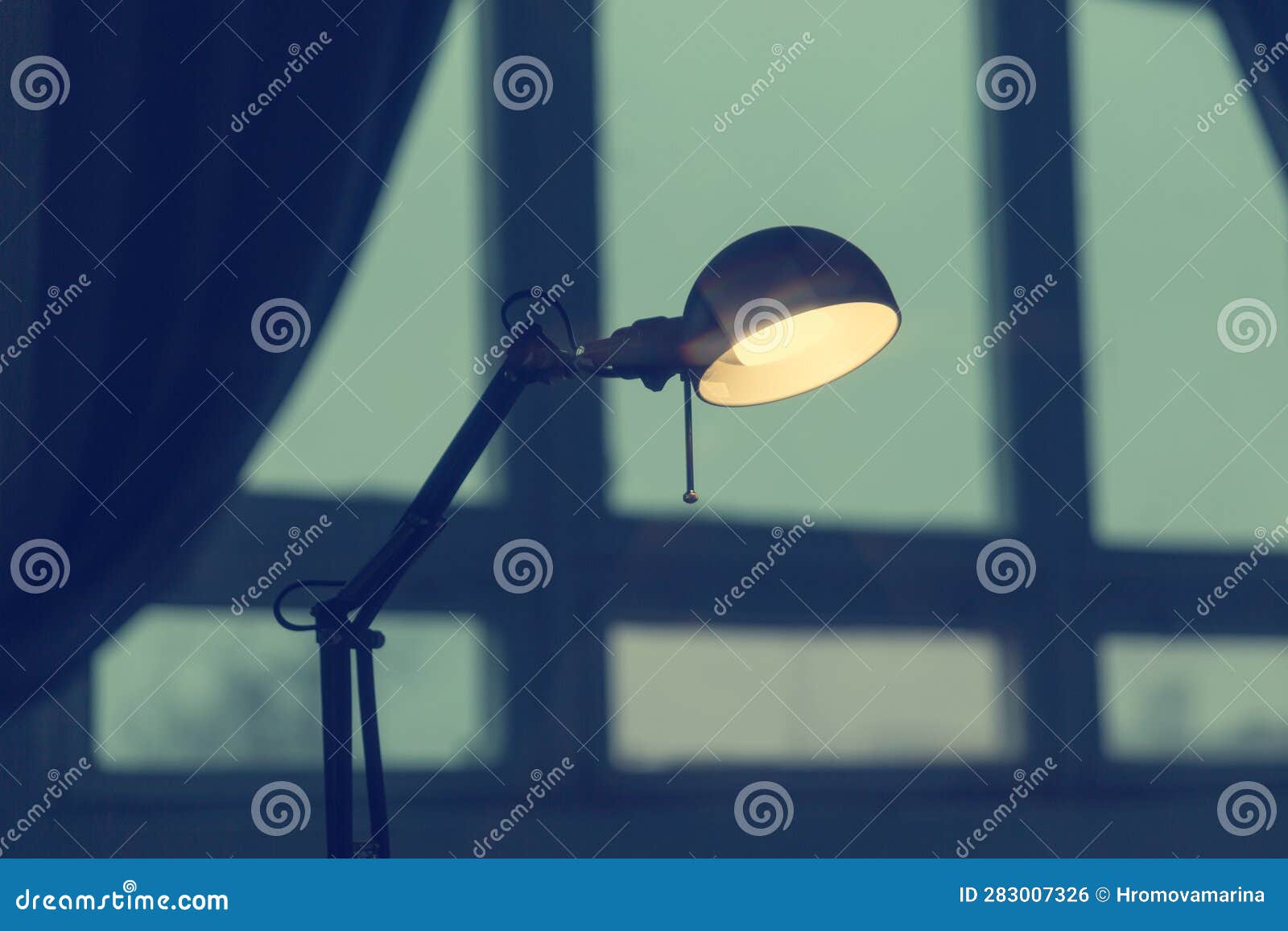 Table Lamp on a Wooden Table on a Blue Background Stock Photo - Image ...