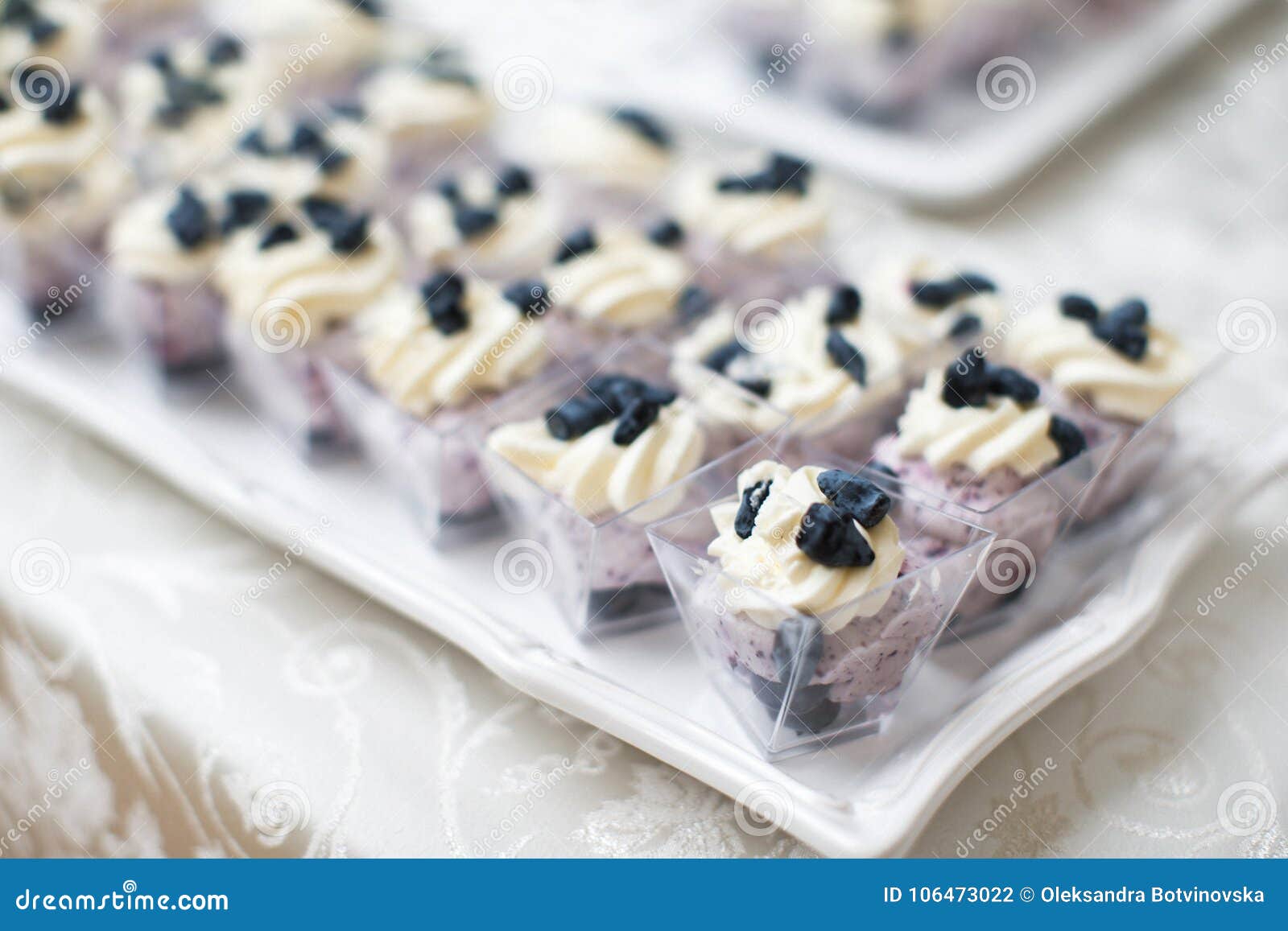 Table with Loads of Cakes and Cupcakes in Boxes Stock Photo - Image of ...