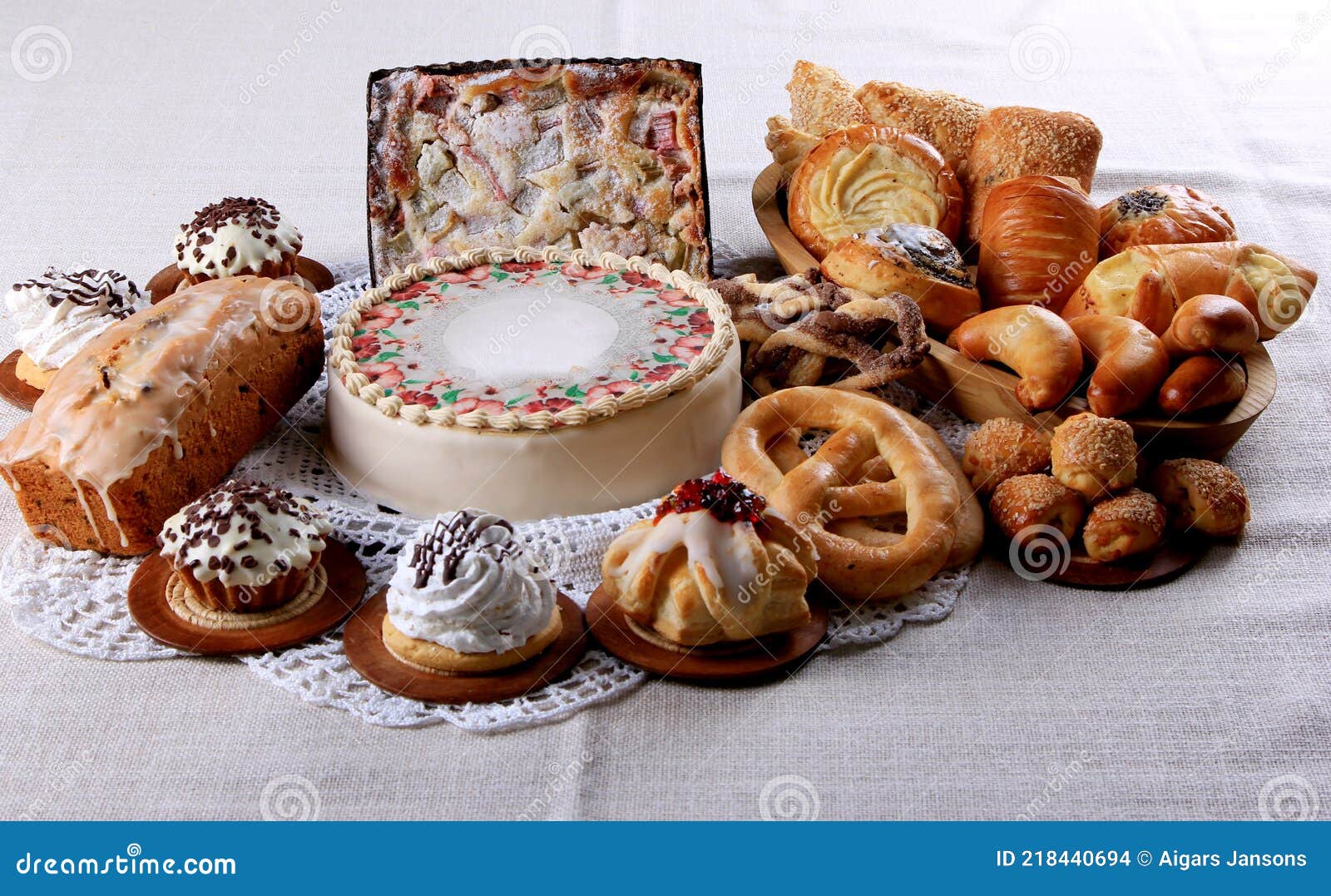 Table with Loads of Cakes, Cupcakes and Pies. Cake Selection on White ...