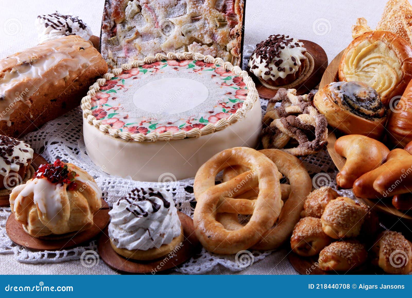 Table with Loads of Cakes, Cupcakes and Pies. Cake Selection on White ...