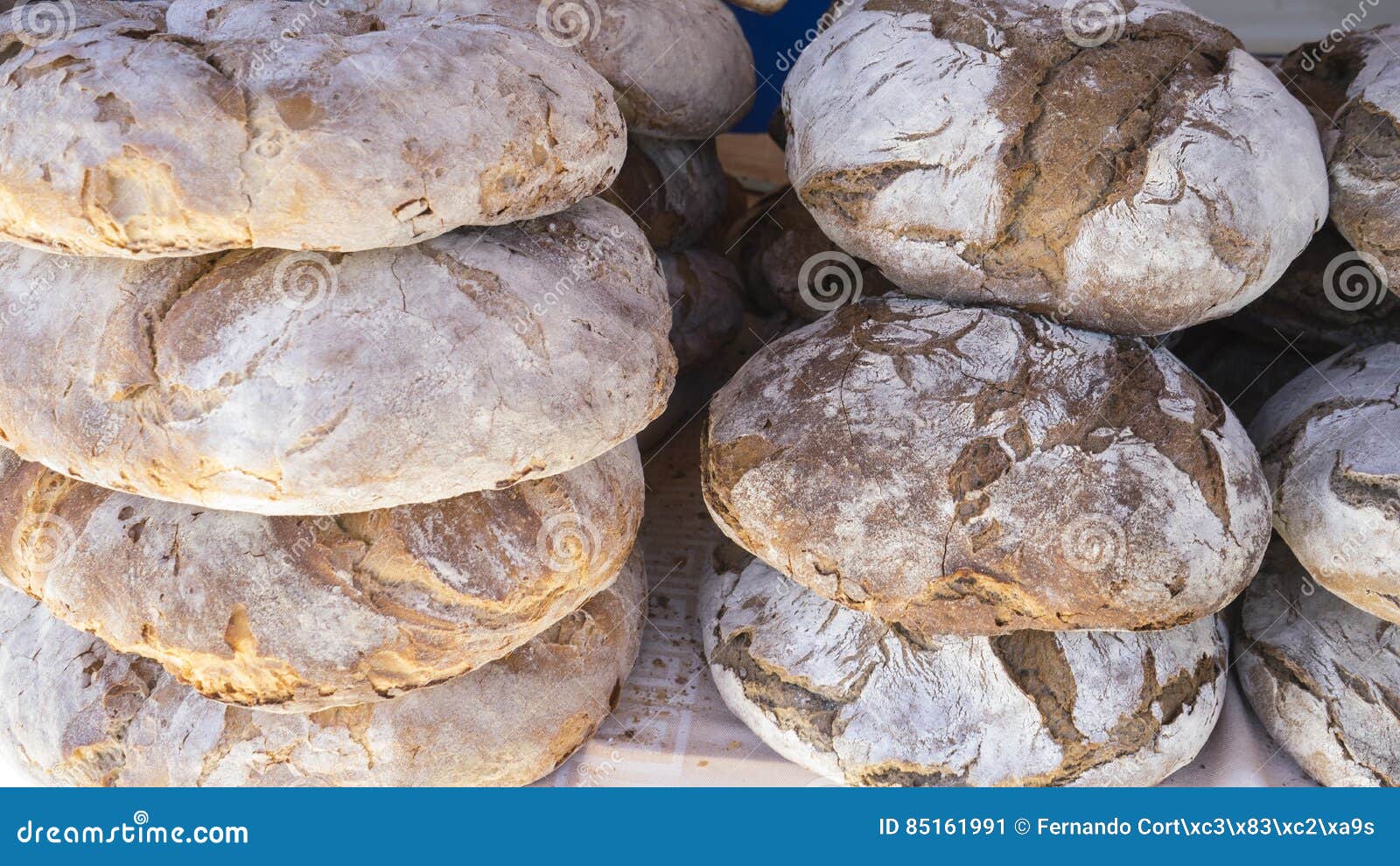 Table with Loaves of Bread Made by Hand at a Medieval Fair in Sp Stock ...