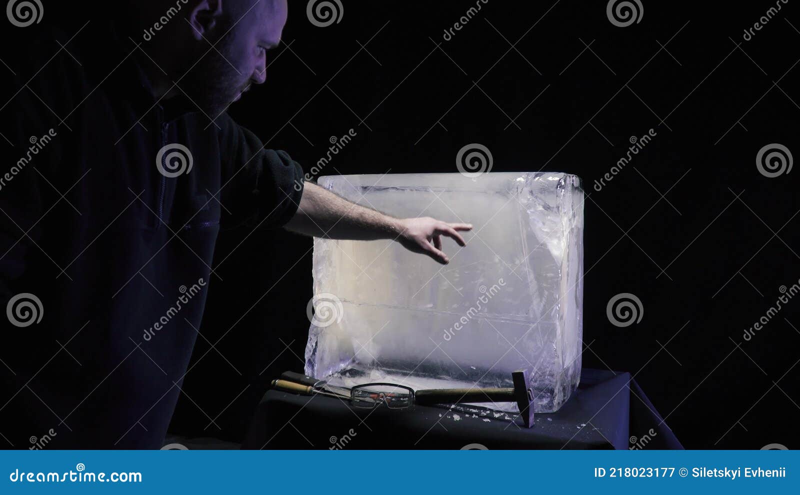 Man is Pointing at the Spots on an Ice Block before Making Ice ...