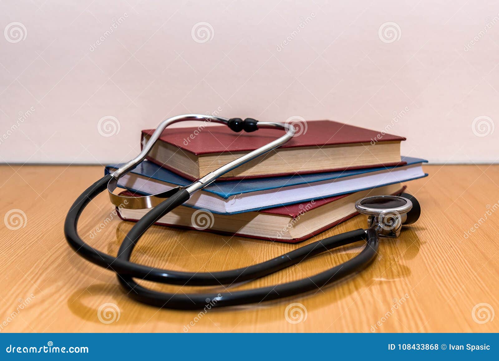 Stethoscope and Medical Books Lying on a Table Stock Photo - Image of ...