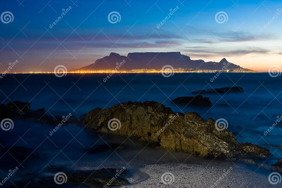 Table mountain sunset stock image. Image of beach, clouds - 6333811