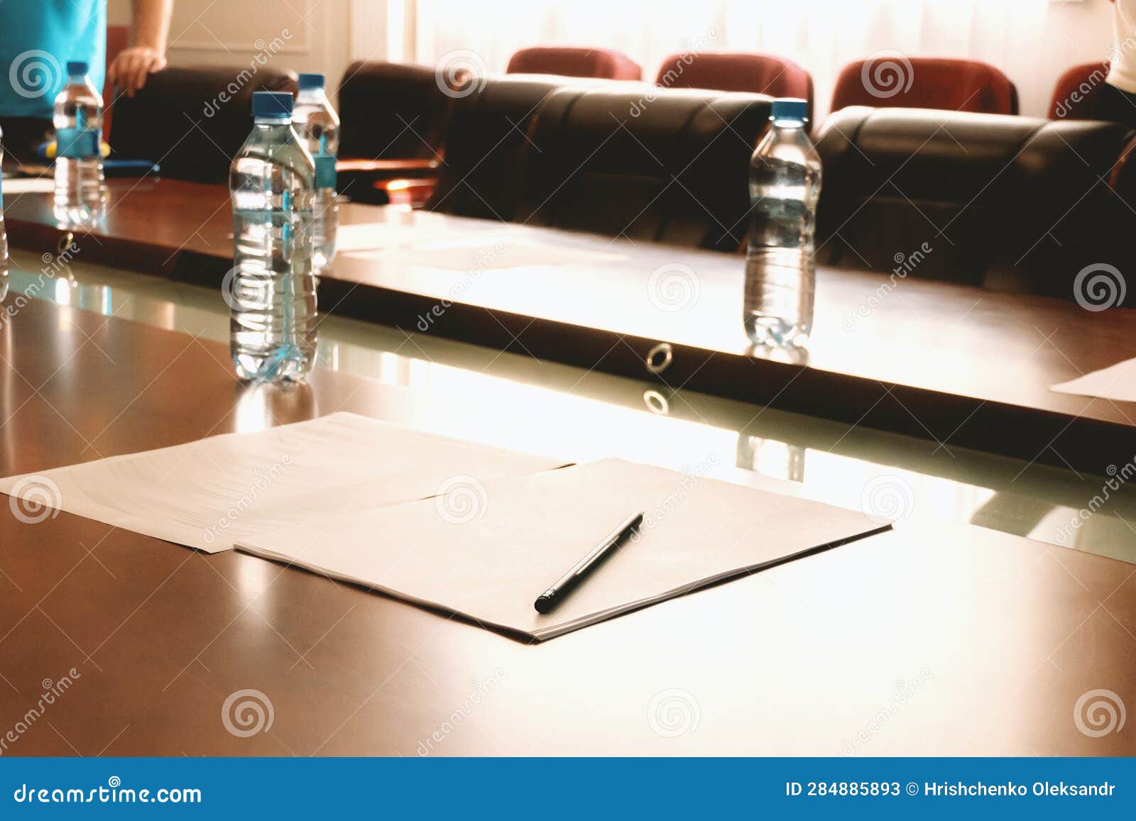 Table for Negotiations. There is a Piece of Paper with a Pen on the ...