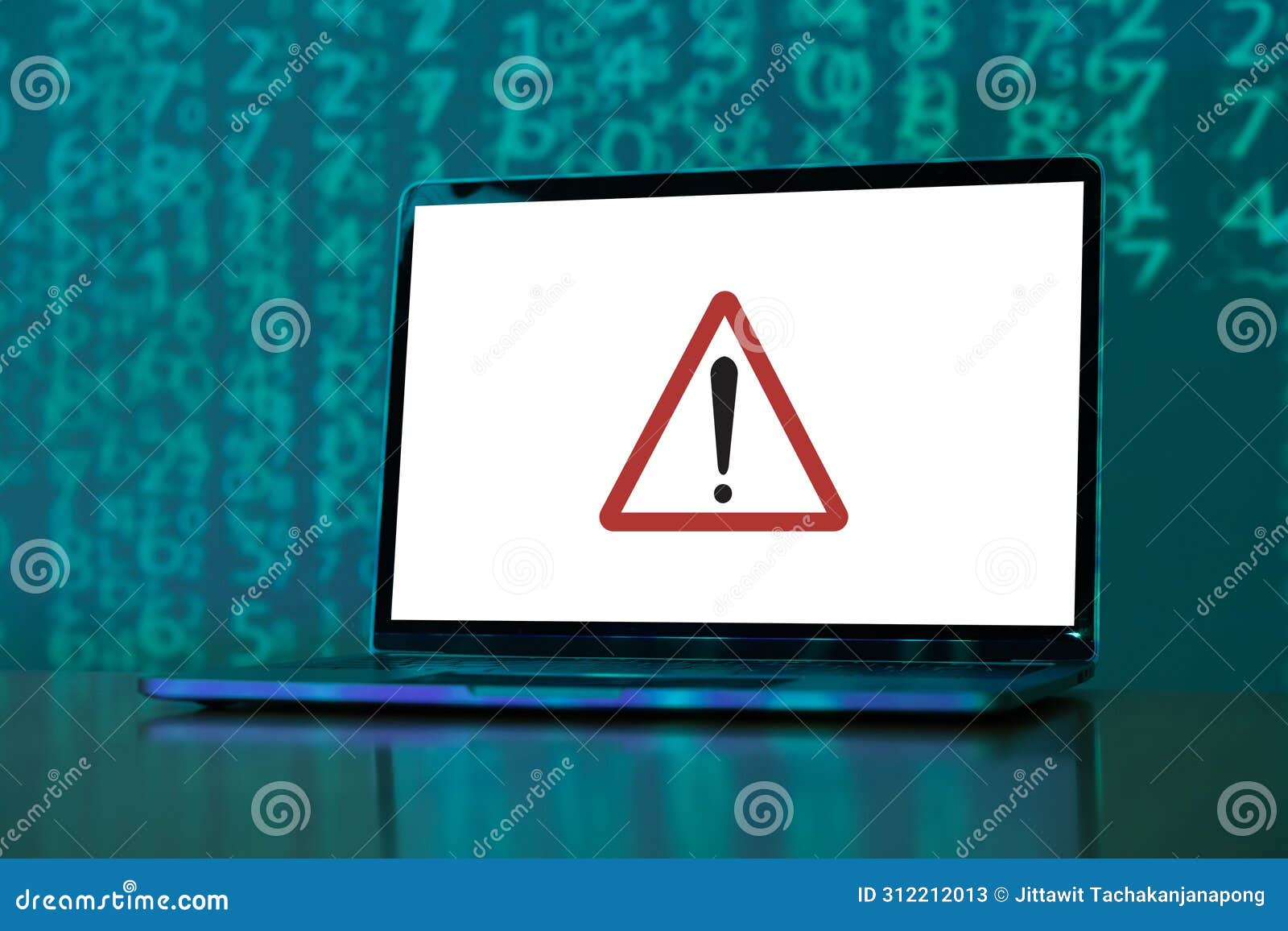 Table with a Notebook Computer Screen that Displays a Symbol Which May ...