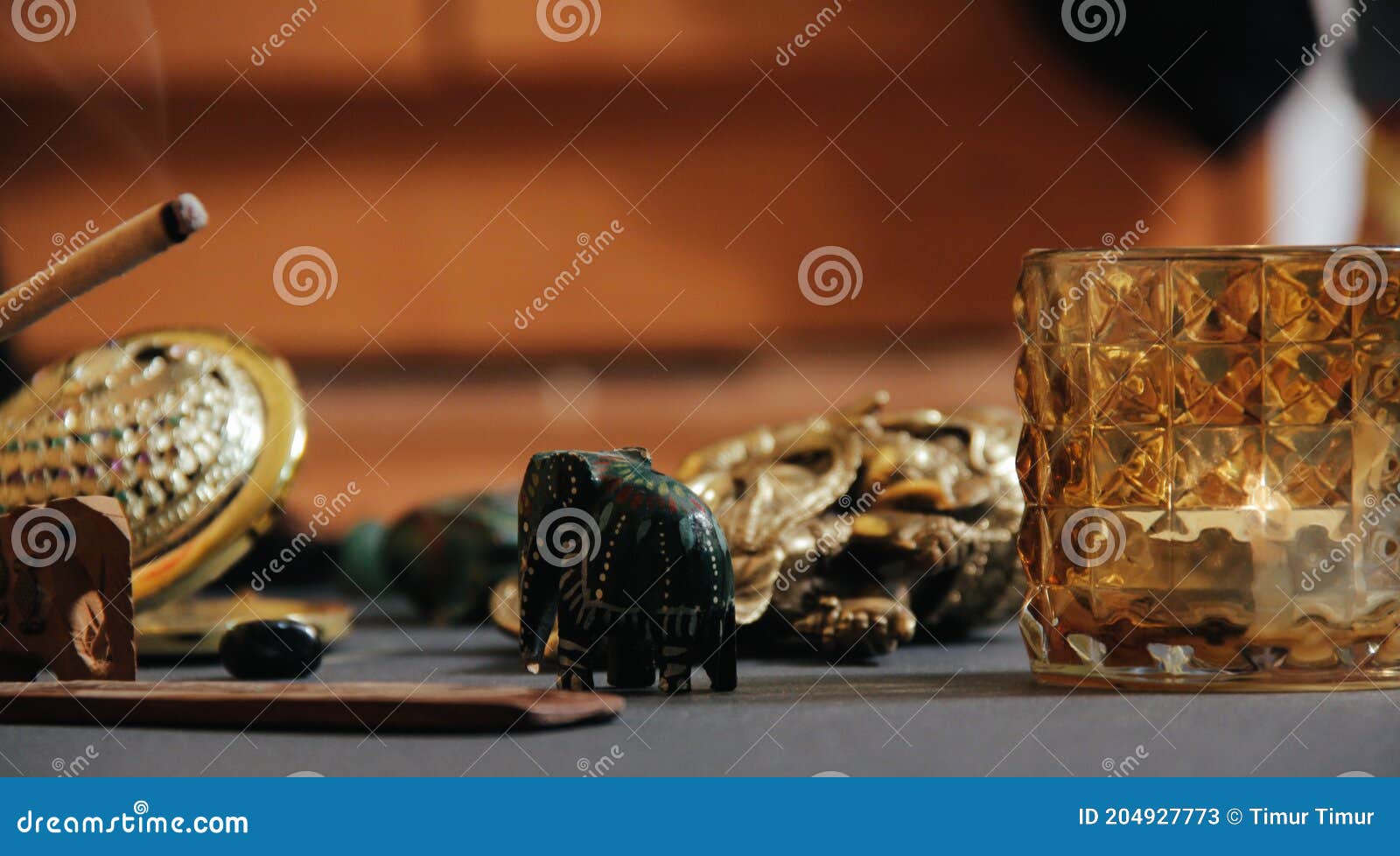 Table with Occult Attributes, Stone Rosaries, Candles, Aroma Stick ...