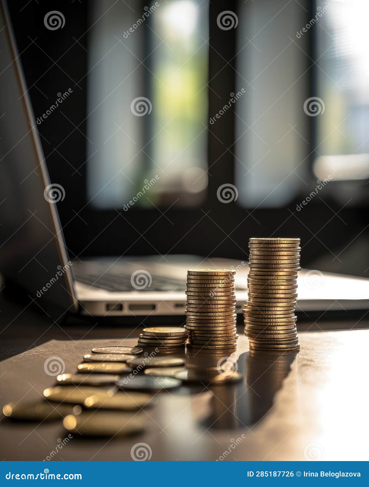 On the Table in the Office is a Stack of Coins and a Computer Stock ...