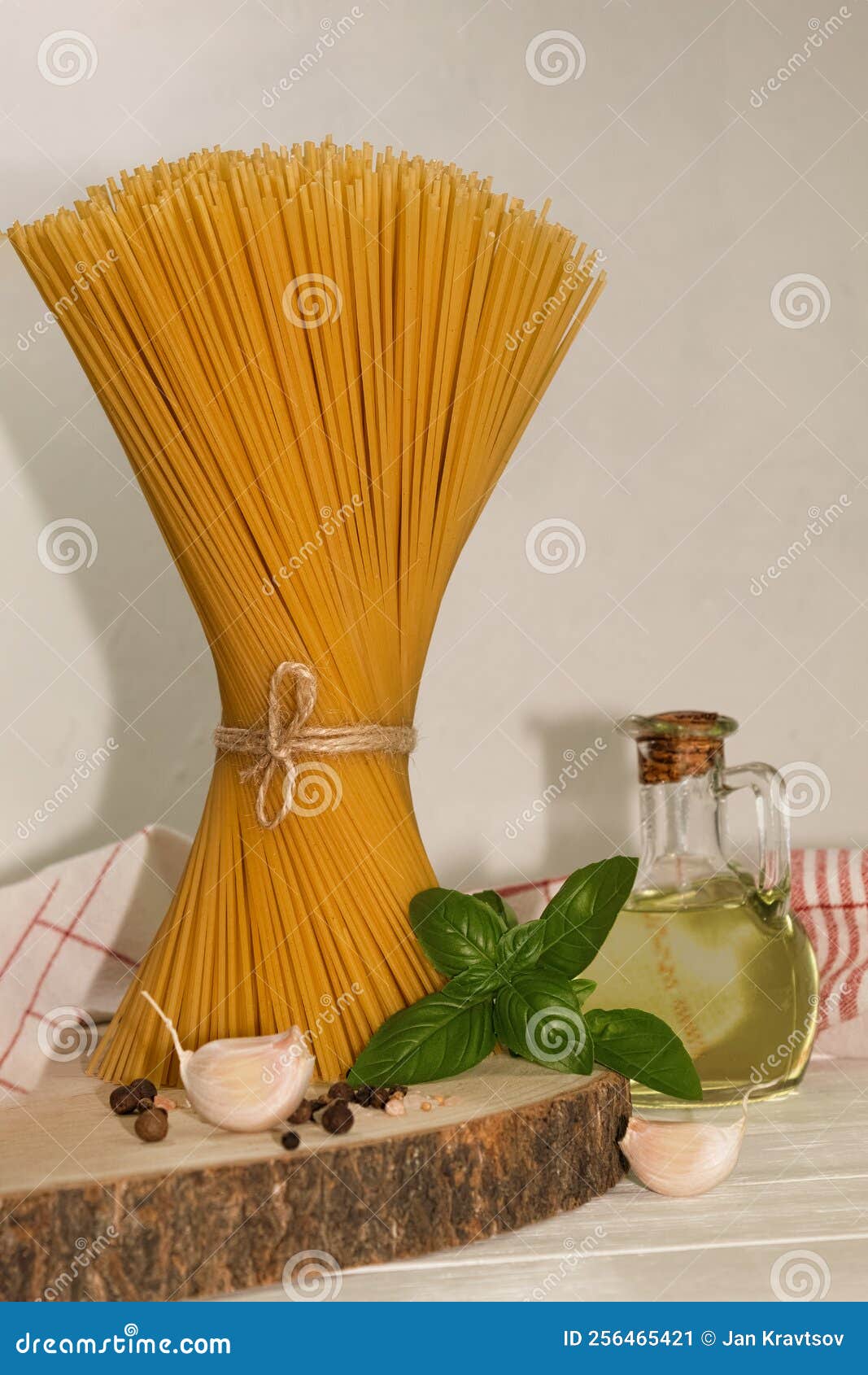 On the Table is a Pack of Spaghetti Tied with String Stock Image ...
