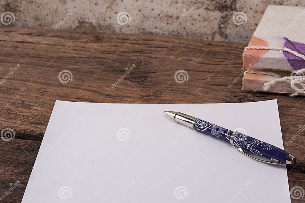 Table with paper and pen stock image. Image of espresso - 71784975