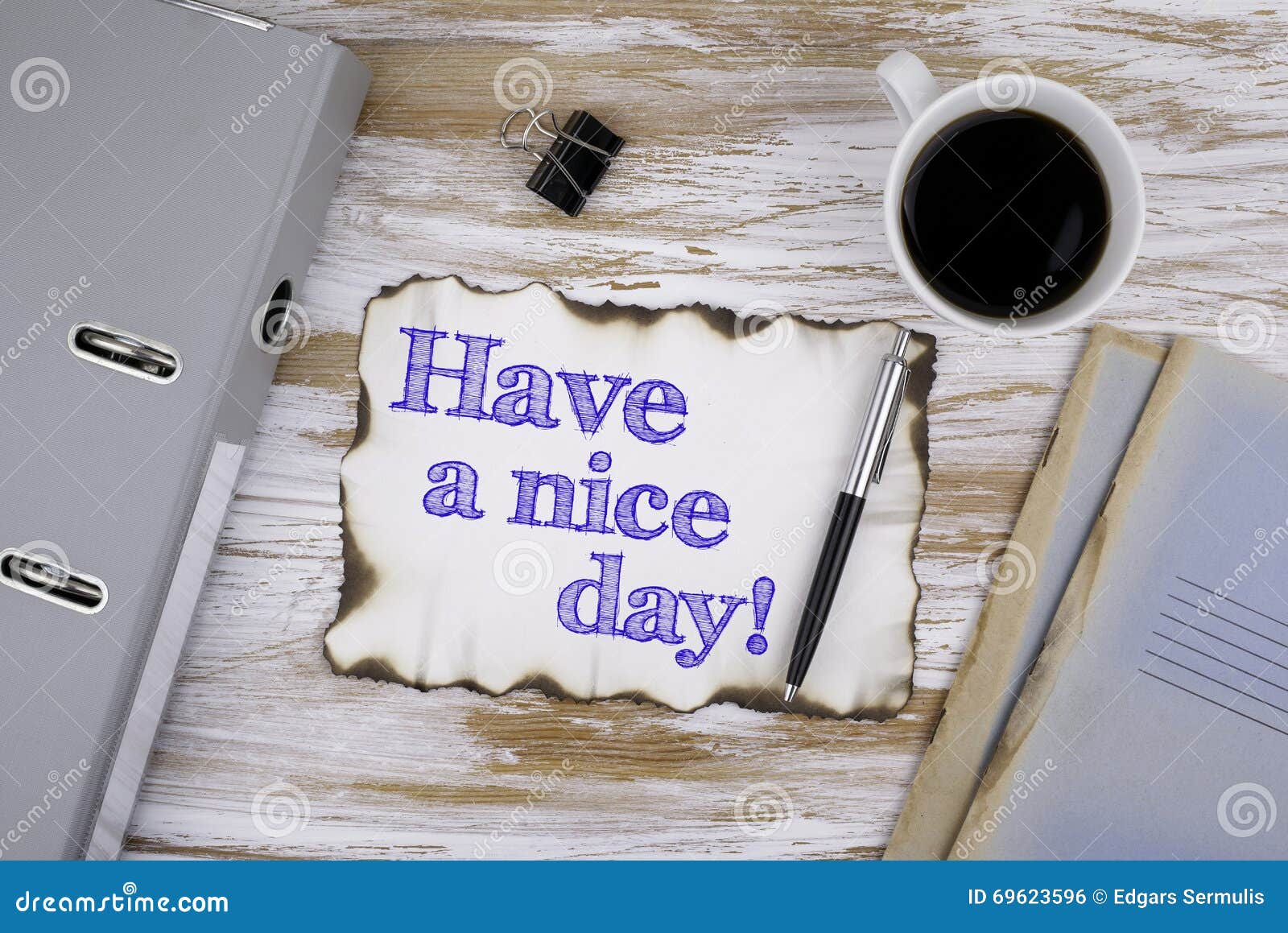 On the Table a Piece of Paper and Text. Have a Nice Day! Stock Photo ...