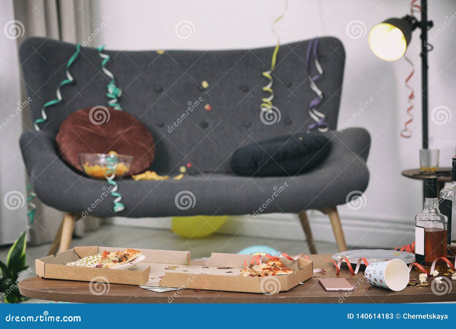 Table with Pizza Leftovers and Alcohol in Messy Room Interior. Stock ...