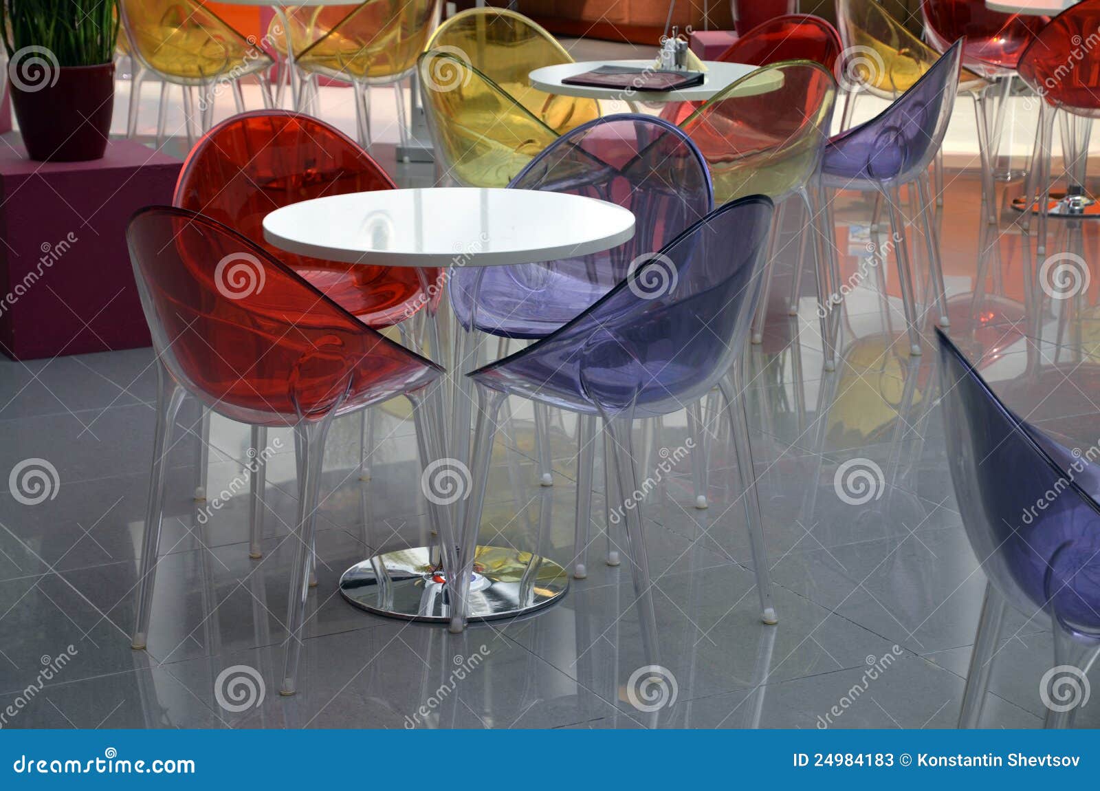Table and plastic chairs stock image. Image of table - 24984183