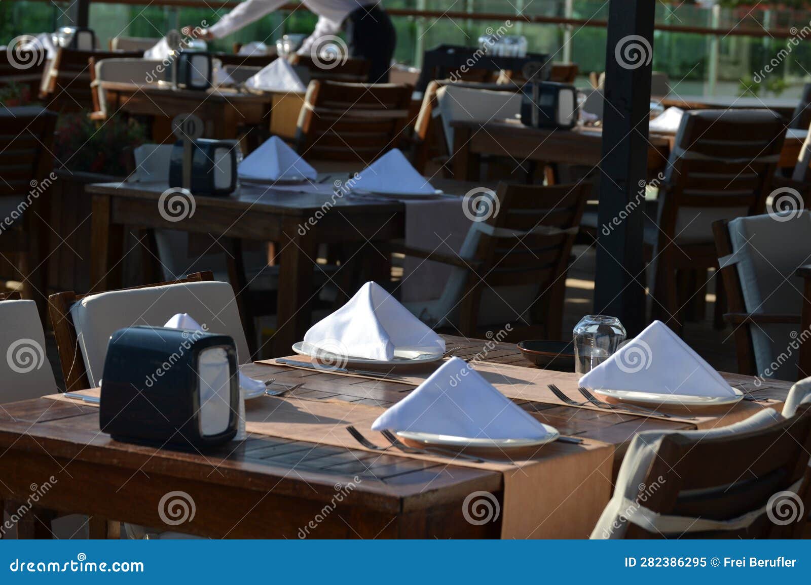 Table Prepared for a Dinner with Plates, Fork, Spoon and Cutlery on ...