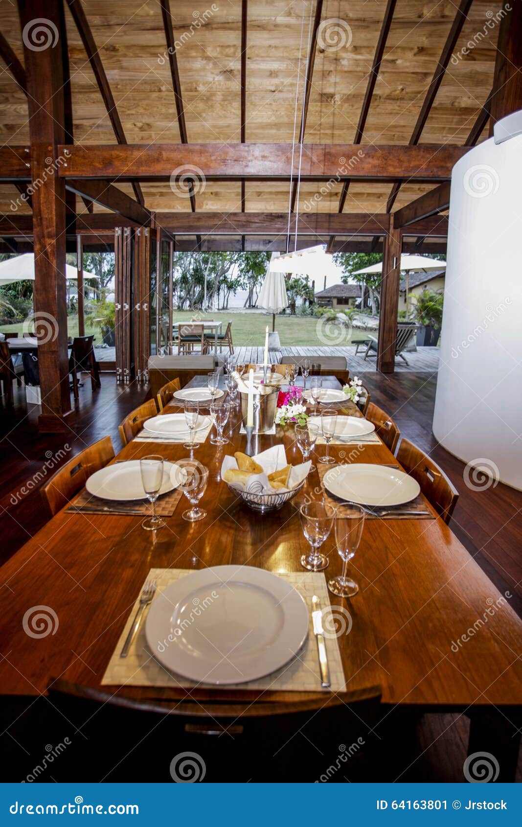 Table ready for dinner stock image. Image of illuminated - 64163801