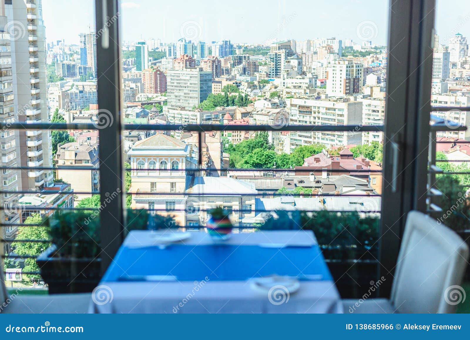 Table in a Restaurant Overlooking the City Stock Photo - Image of food ...