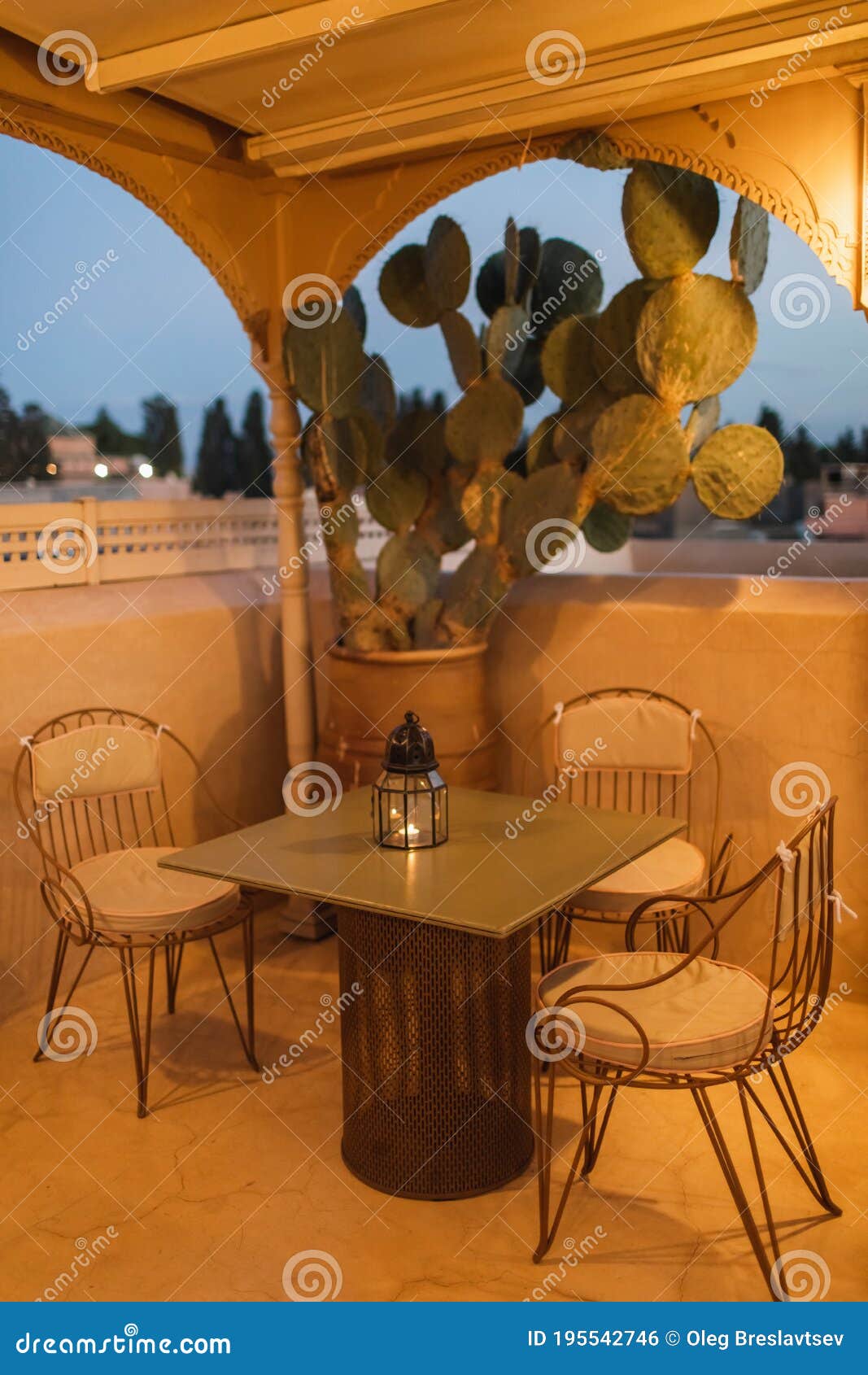 Table for Romantic Dinner on Rooftop Terrace in Evening. Moroccan Style ...