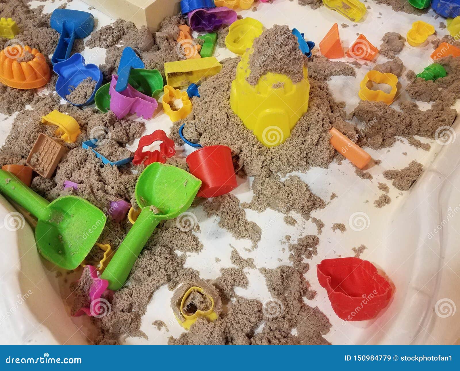 Table with Sand and Plastic Tools for Kids To Play with Stock Image ...