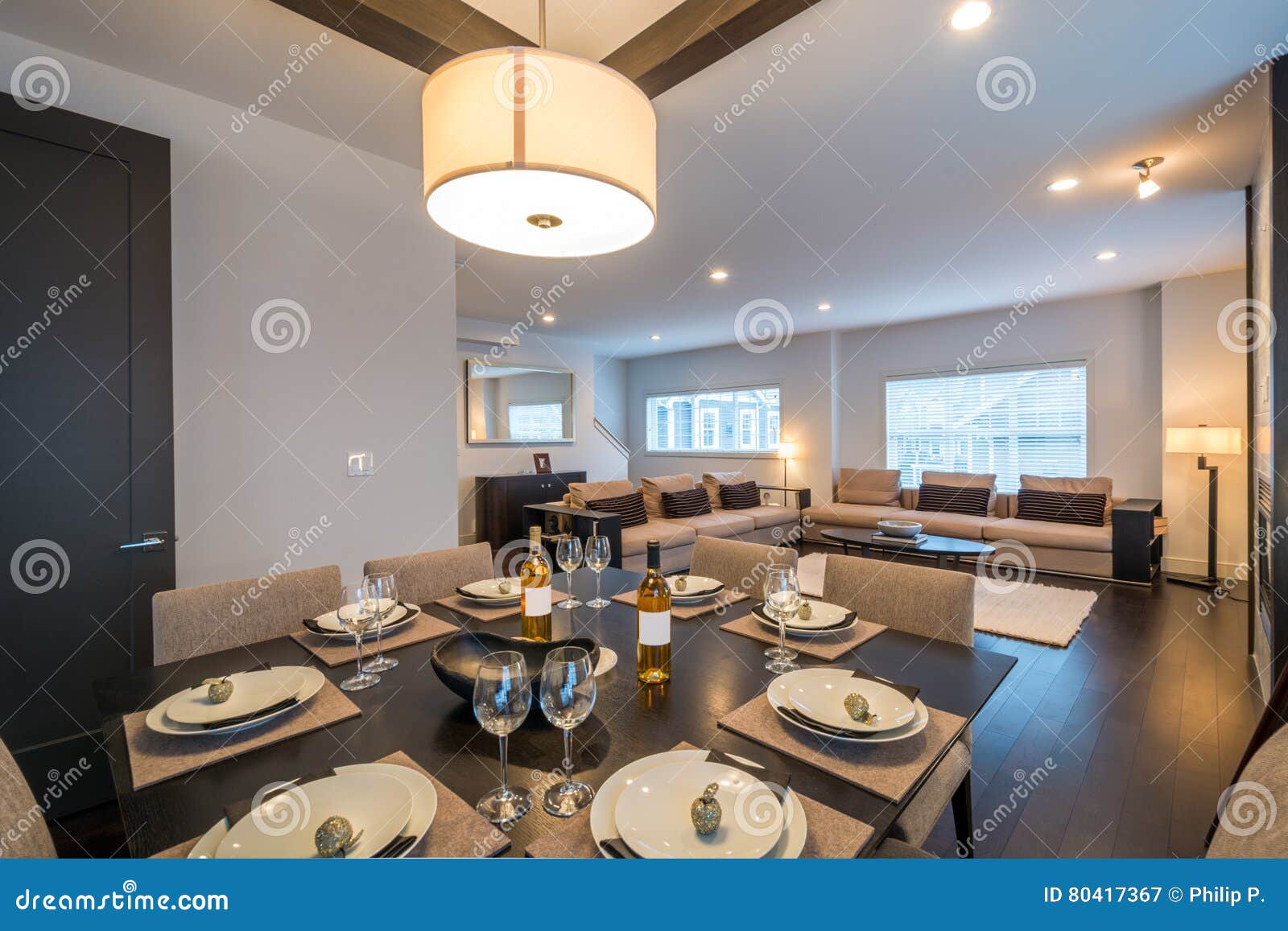 Table Set for Dinner in a Spacious Dining Room Stock Image - Image of ...