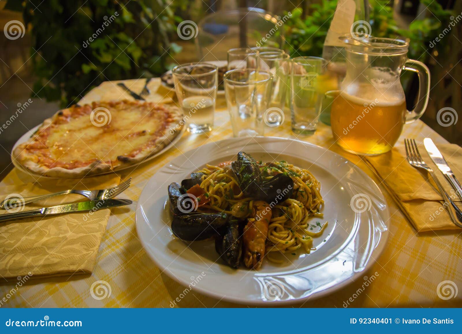 Table set ready for dinner stock image. Image of food - 92340401