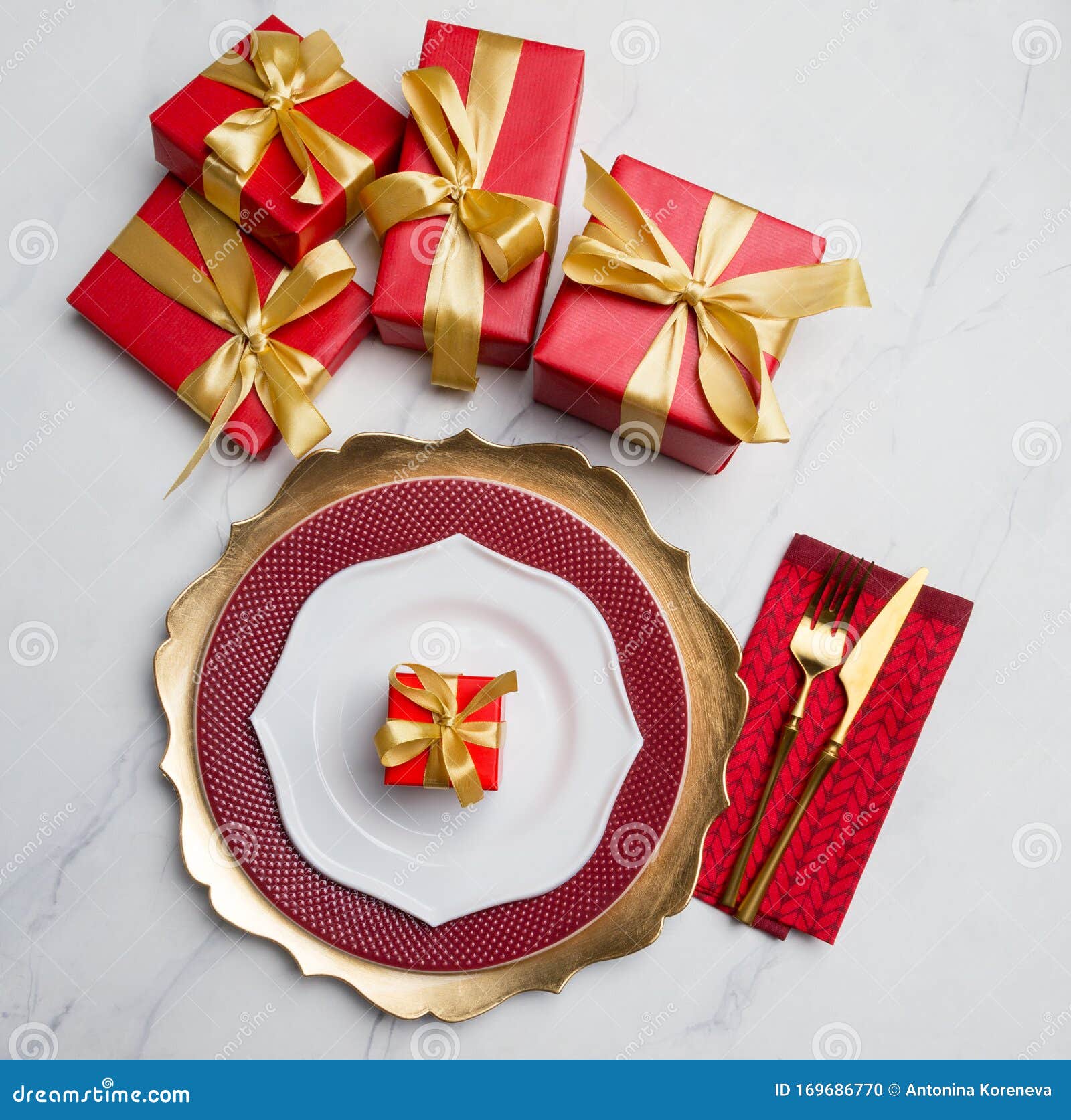 Table Set with Red and Gold Gift Boxes Stock Photo - Image of elegance ...