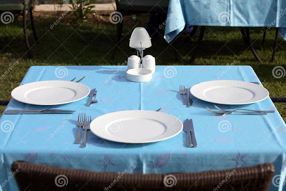 Table set on a restaurant stock photo. Image of chair - 15077216