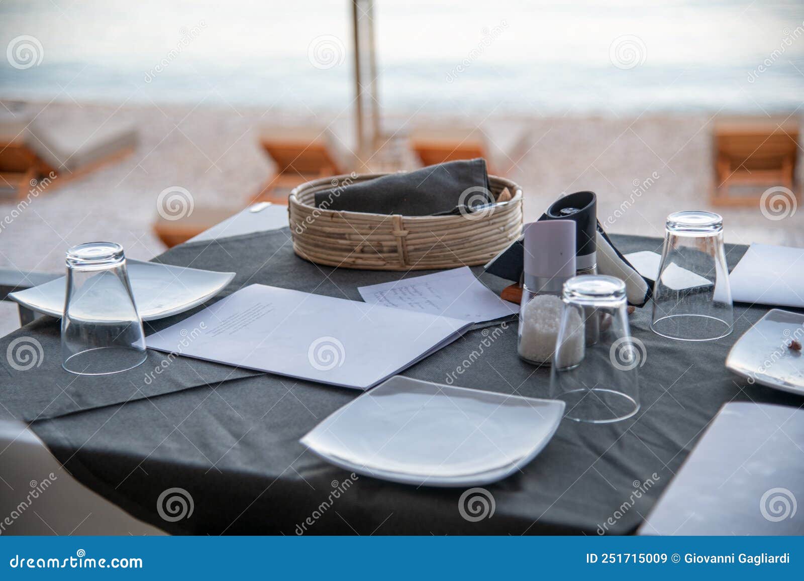 Table Set at Sunset with an Ocean View Stock Image - Image of evening ...