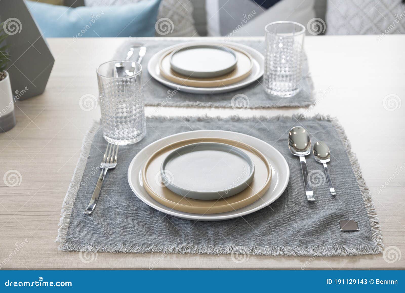 Table Set on Table with Yellow Plate Setting in Modern Style Dining ...