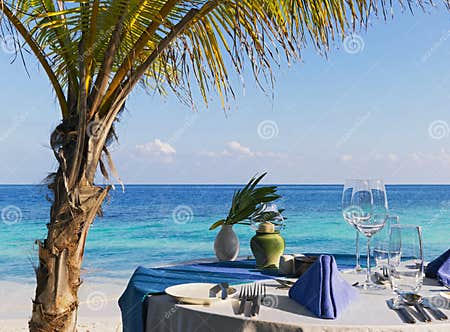 Table Setting at Beach Restaurant Stock Photo - Image of dinner, beach ...