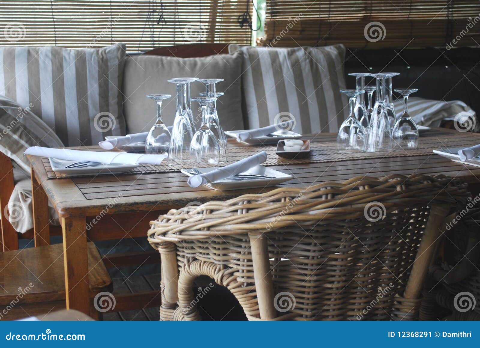 Table setting in Bistro stock image. Image of cushions - 12368291
