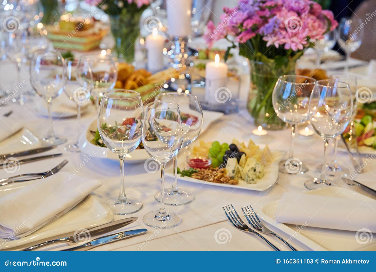 Table Setting for Guests in a Restaurant, on the Table Forks and ...