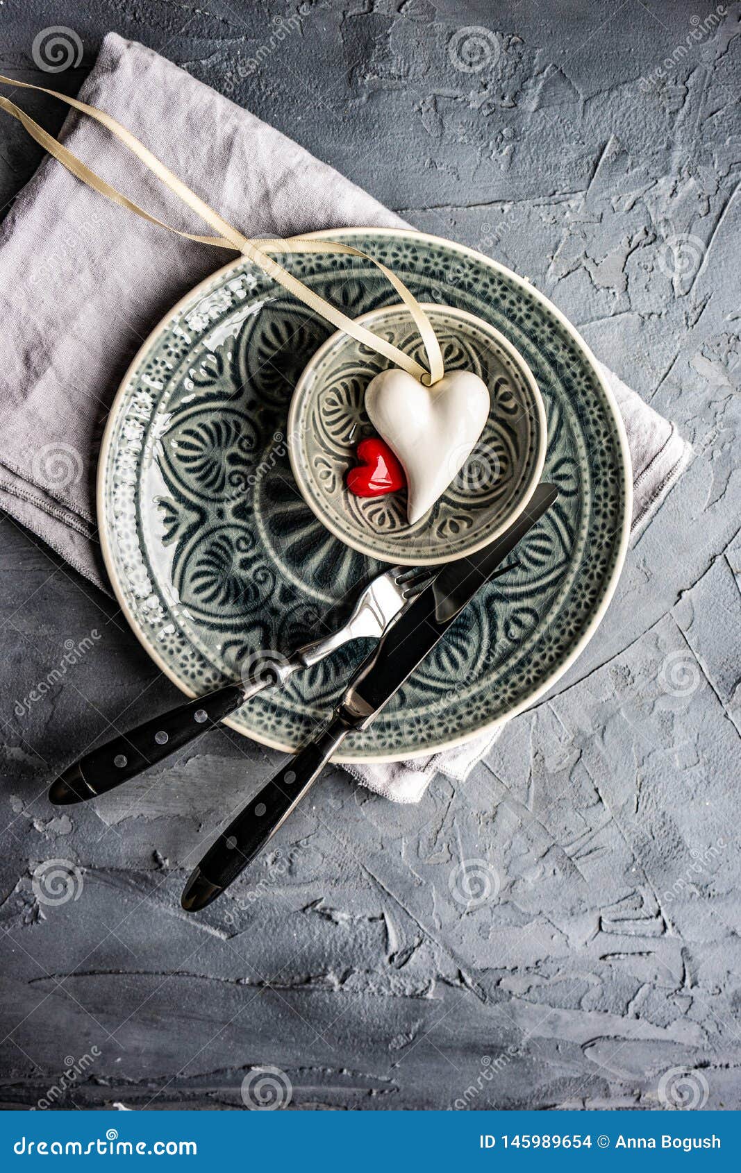 Table setting with hearts stock photo. Image of silverware - 145989654