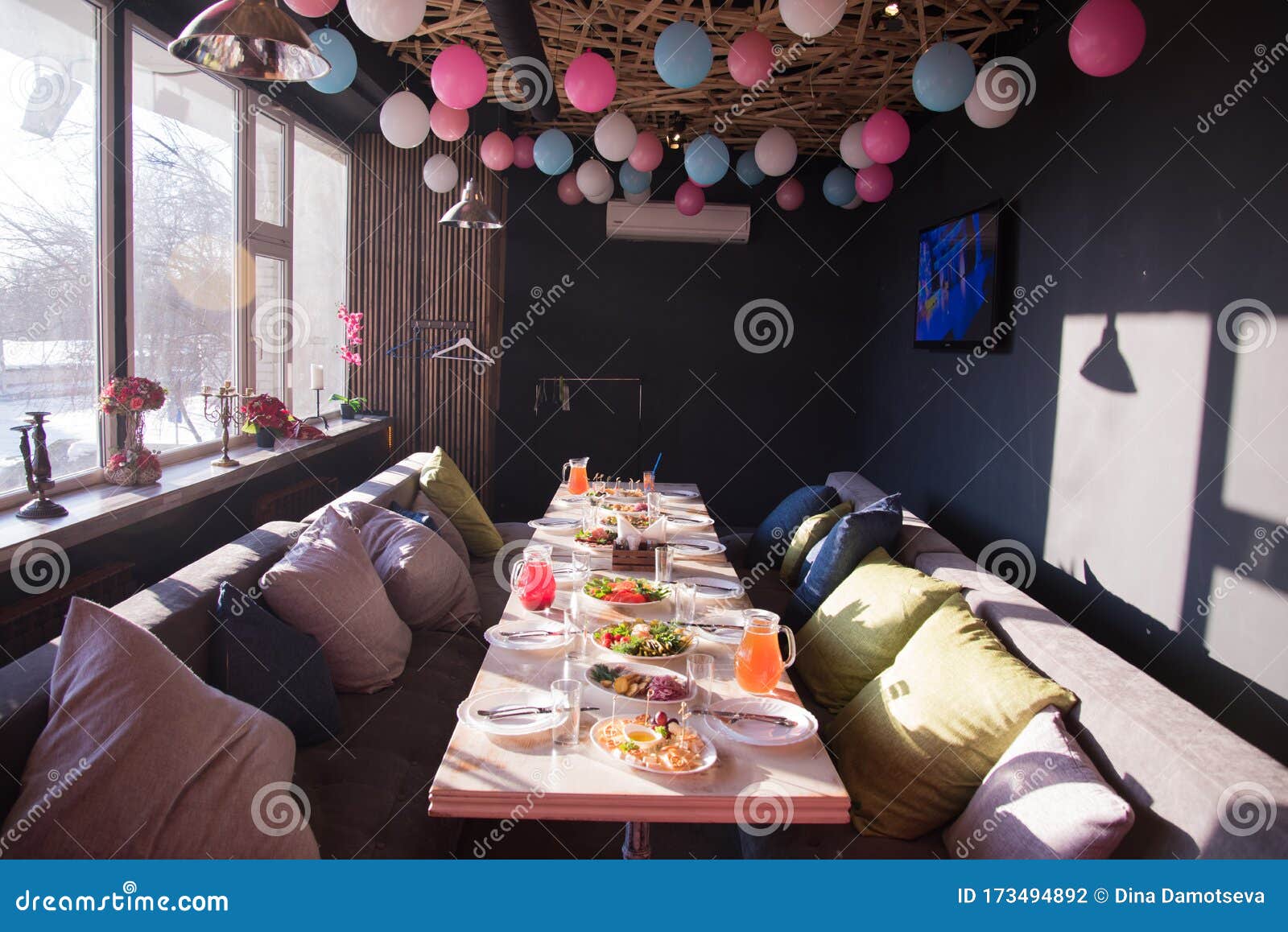 Table Setting for a Party or Banquet in a Cozy Small Room. There are ...