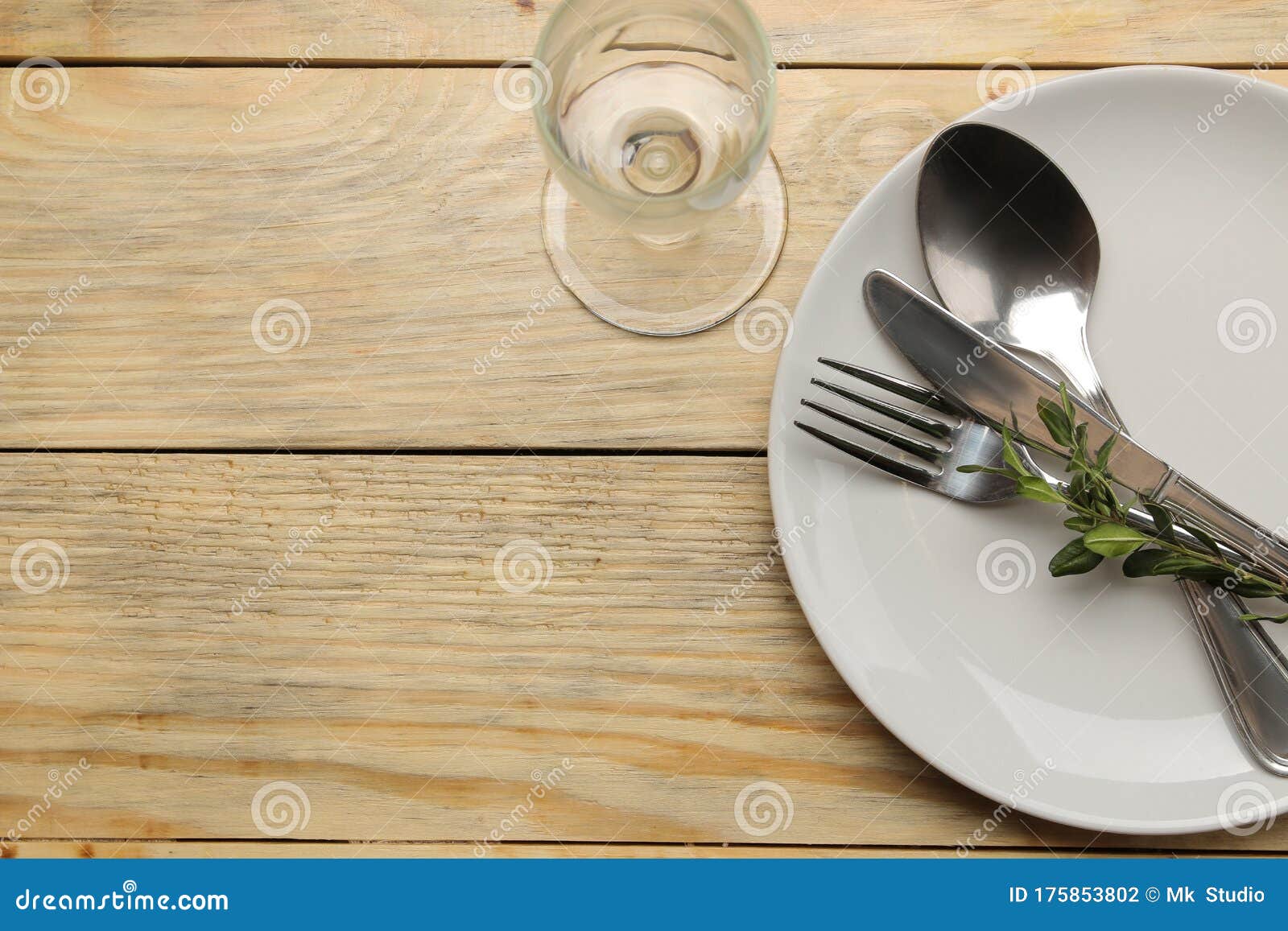 Table Setting. Plate, Glass and Cutlery Fork, Spoon and Knife on a ... Table Setting. Plate, Glass and Cutlery Fork, Spoon and Knife on a ...