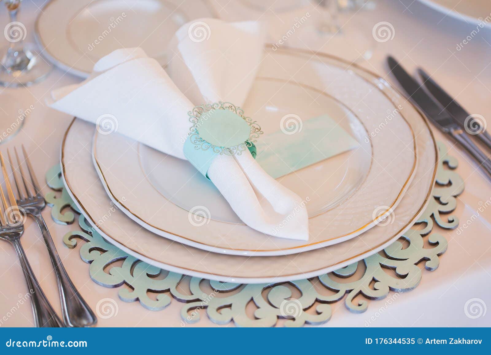The Table Setting with Plates and Silverware. Stock Image - Image of ...