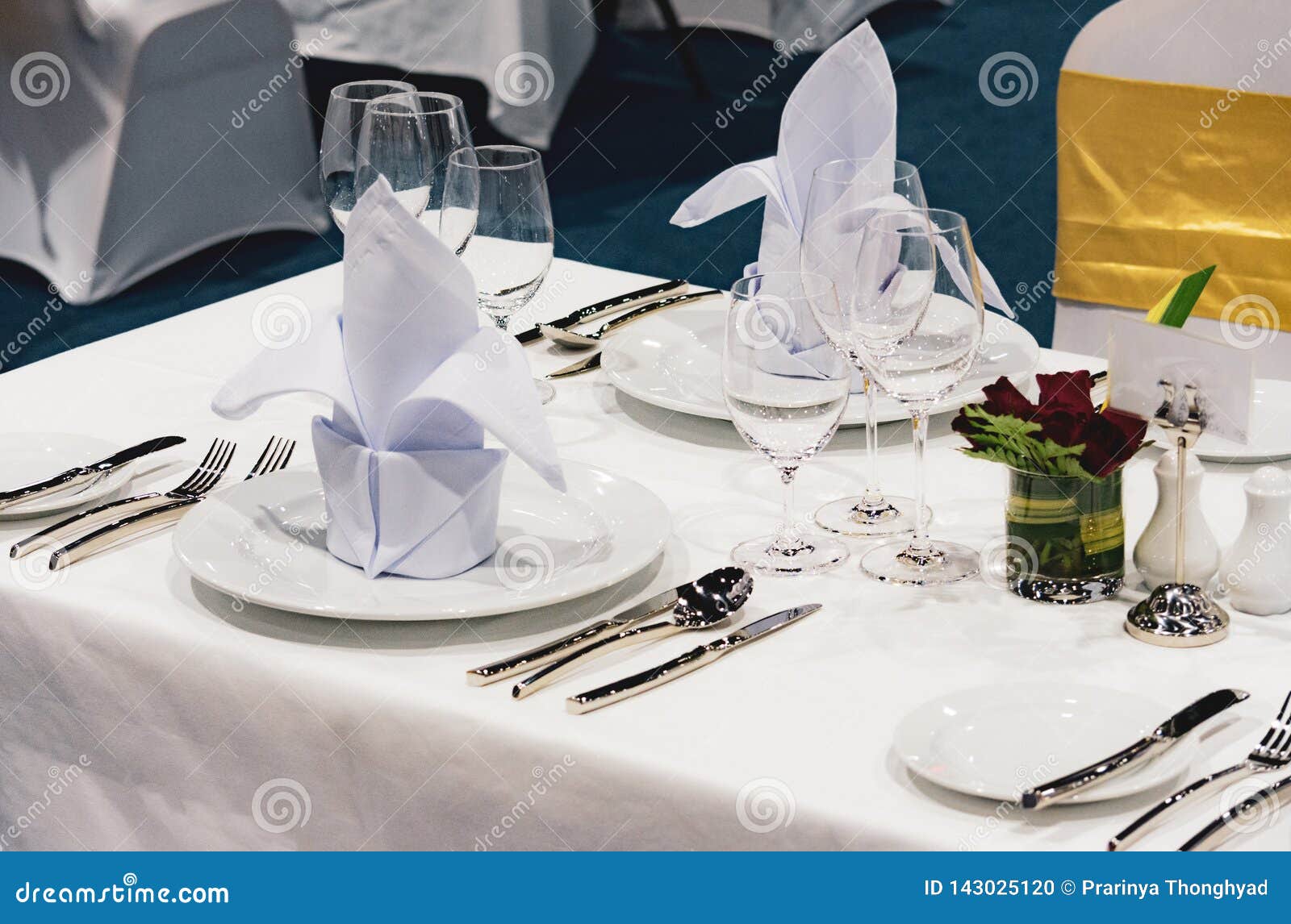 Table Setting in the Restaurant, Water in the Grass on the Dining Table ...
