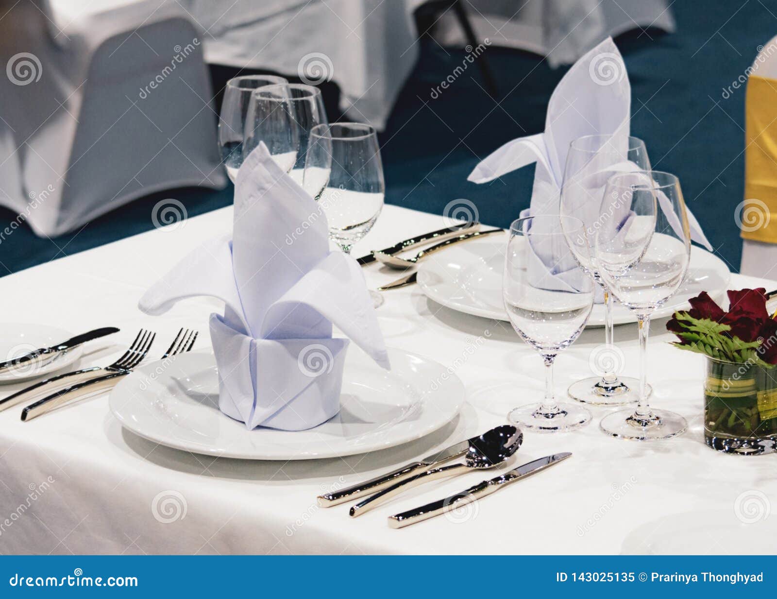 Table Setting in the Restaurant, Water in the Grass on the Dining Table ...