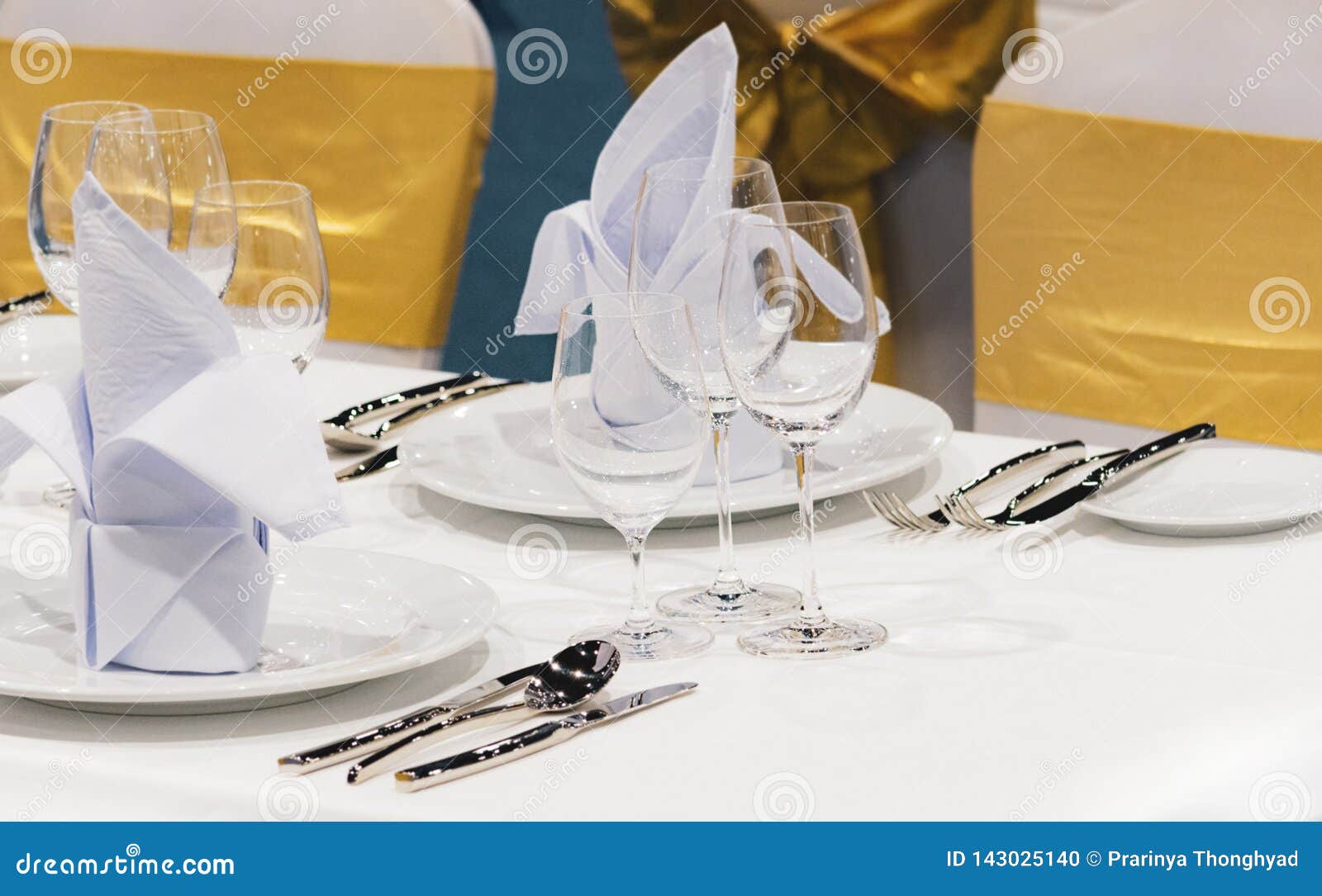 Table Setting in the Restaurant, Water in the Grass on the Dining Table ...