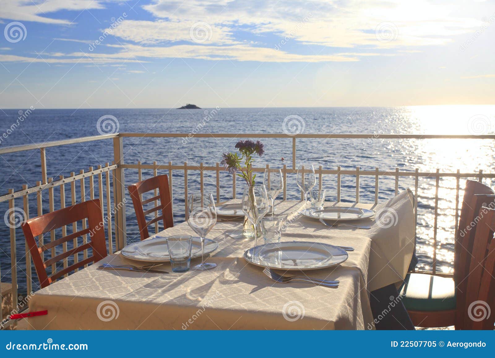 Table setting by the sea stock image. Image of outdoors - 22507705