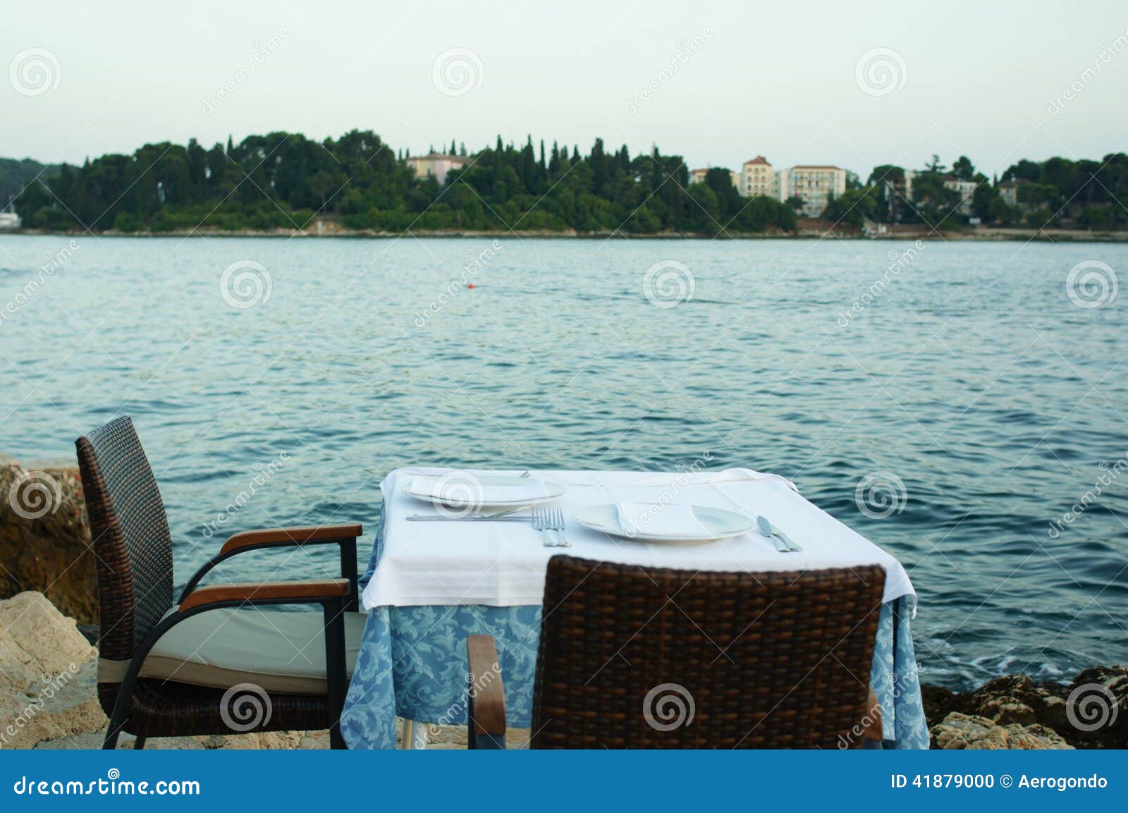 Table setting by the sea stock photo. Image of summer - 41879000
