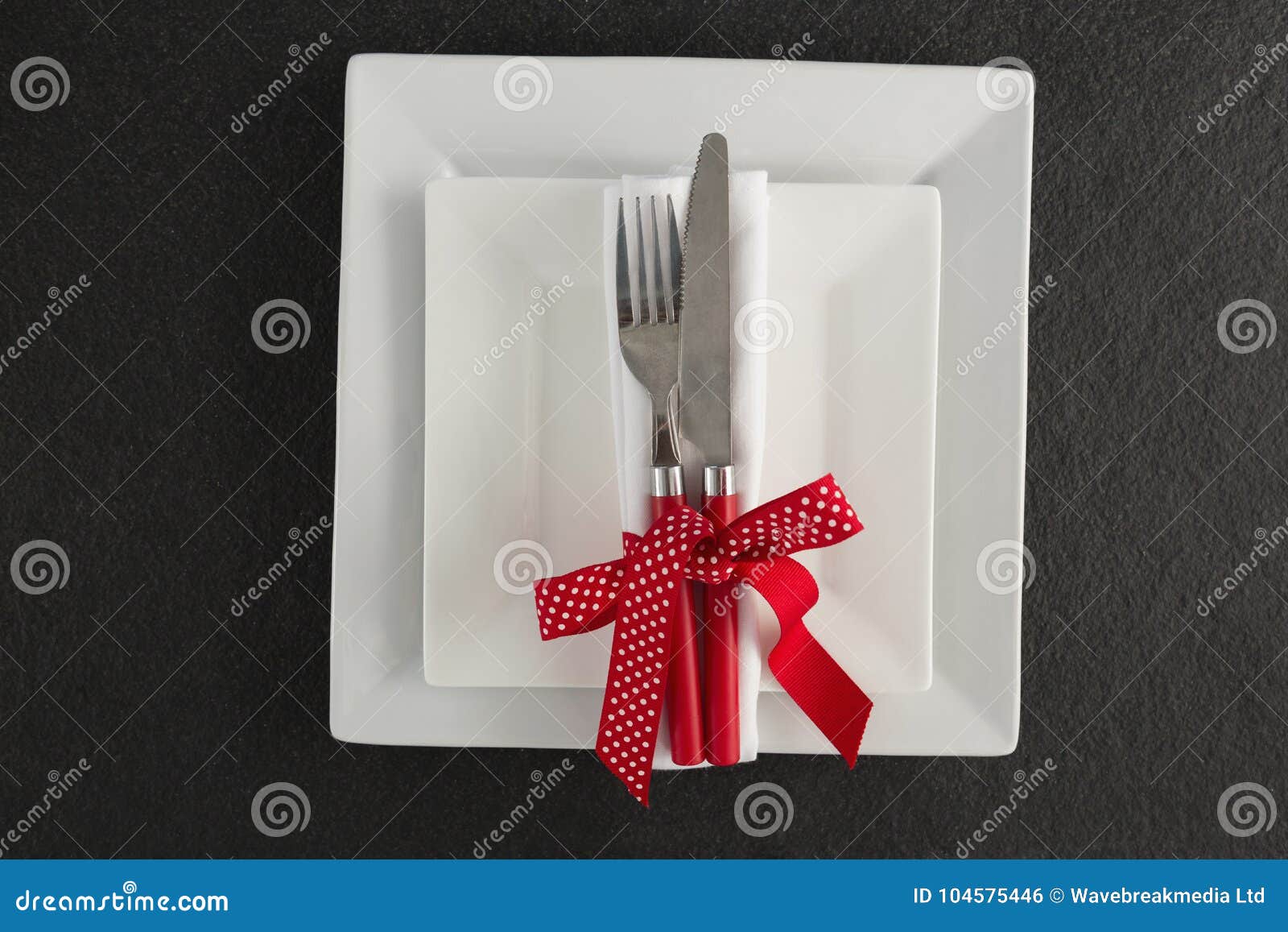 Table Setting with Square Plates and Cutlery Stock Photo - Image of ...