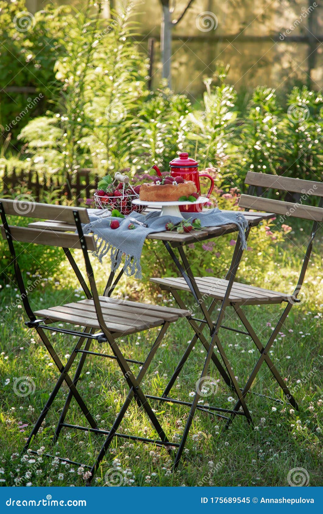 Table Setting with Summer Strawberry Cake in a Garden Stock Image ...