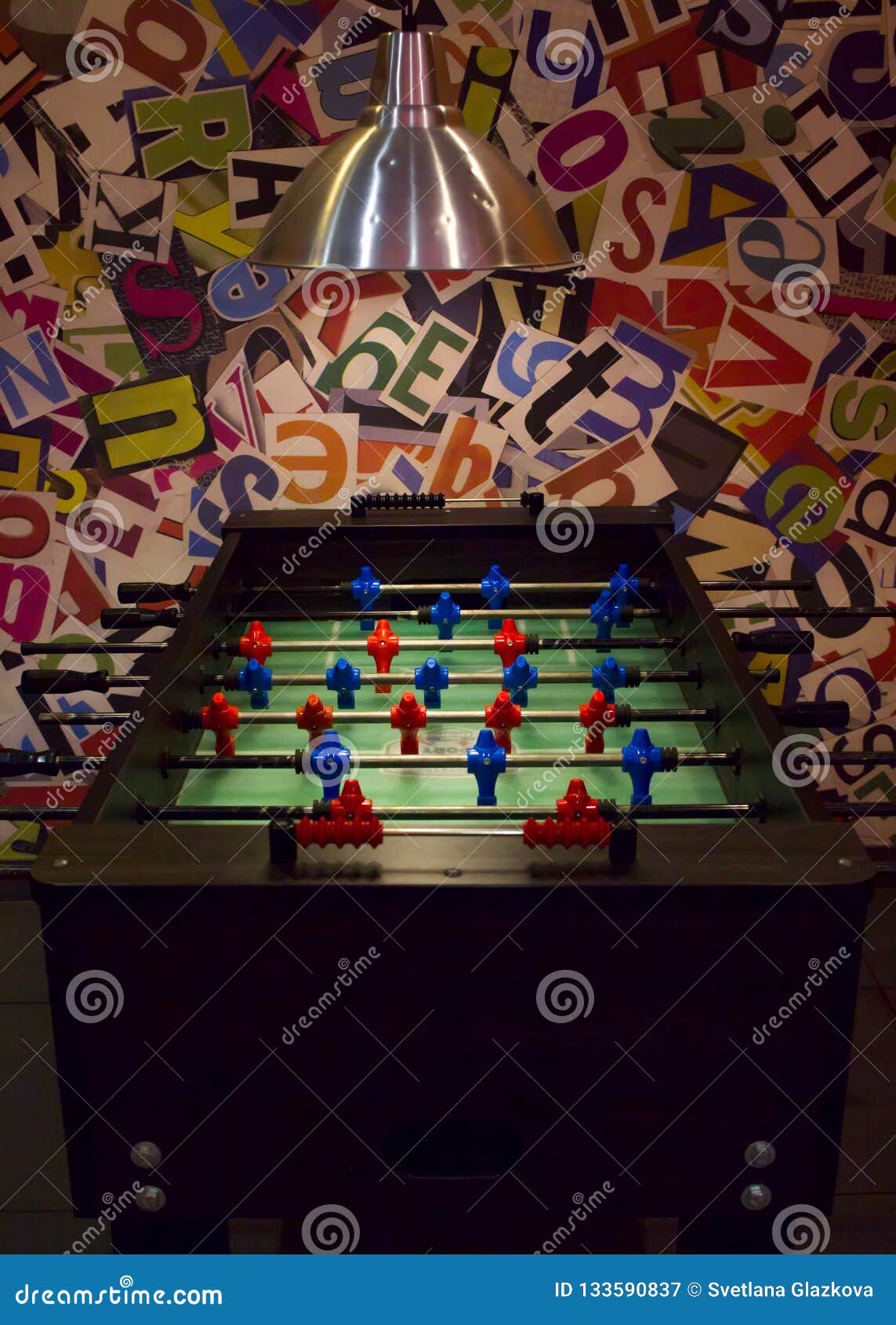 Table soccer in game room. stock image. Image of field - 133590837